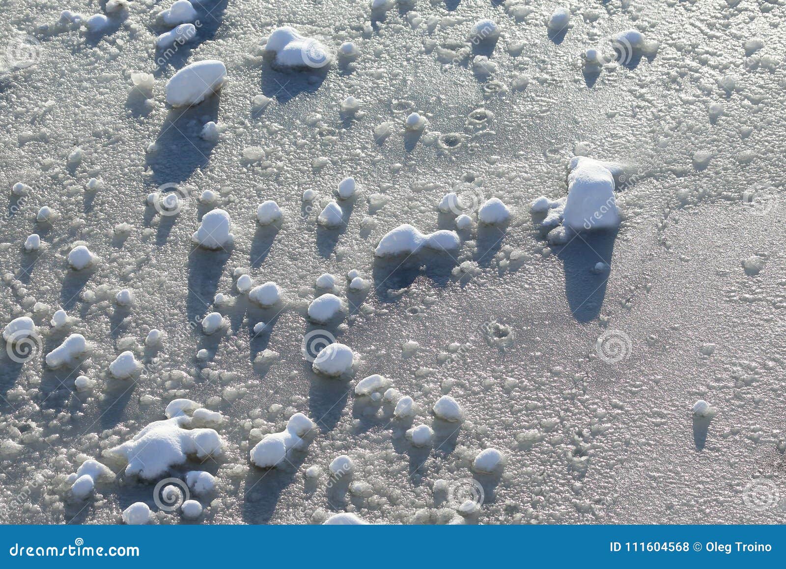 Clumps of snow on the ice stock photo. Image of freeze - 111604568