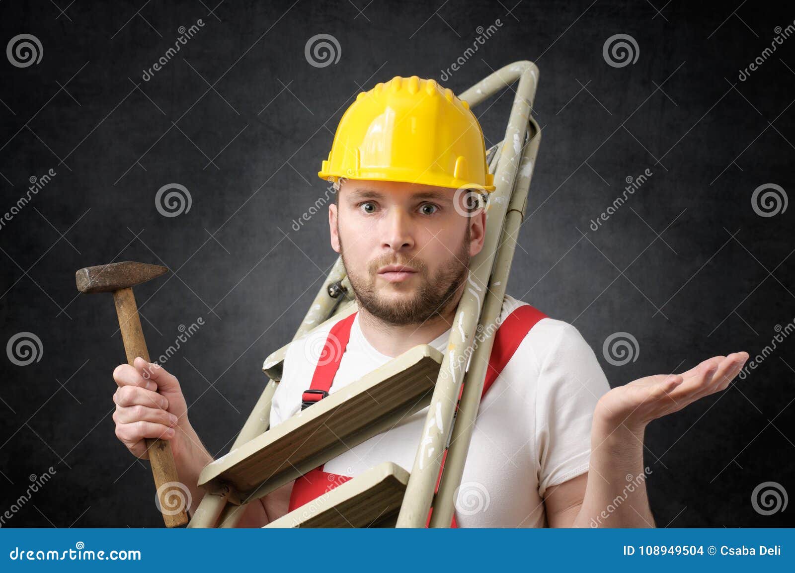 Clumsy worker with tools stock photo. Image of industry - 108949504