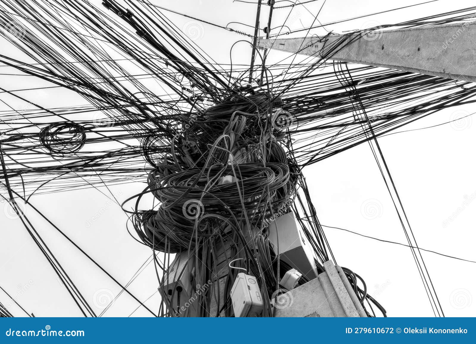 A Cluster of Wires and Cables Entangled on a Pole, Capturing the ...