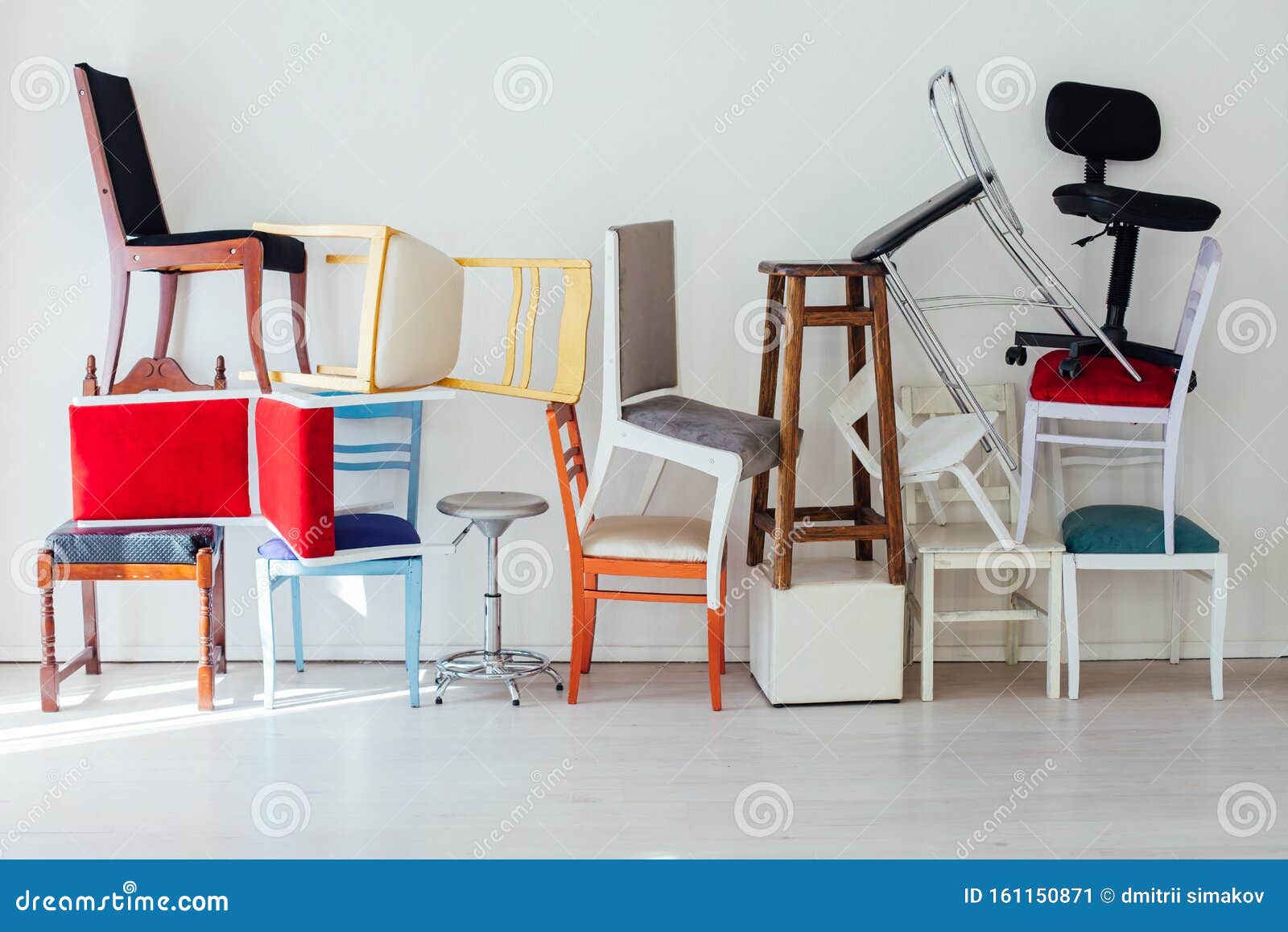 Many Different Chairs Stand in the White Room Stock Image - Image of ...