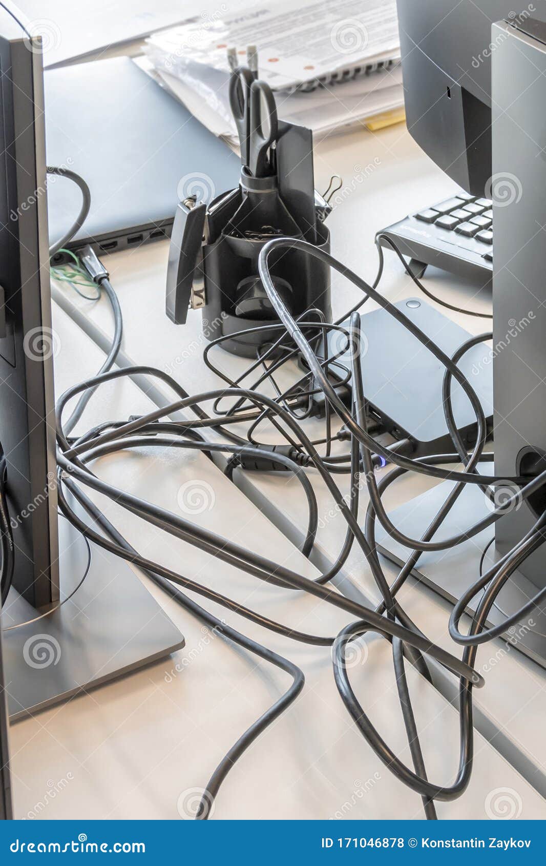 Clutter In Office On The Table. Unwound And Tangled Electrical Computer ...