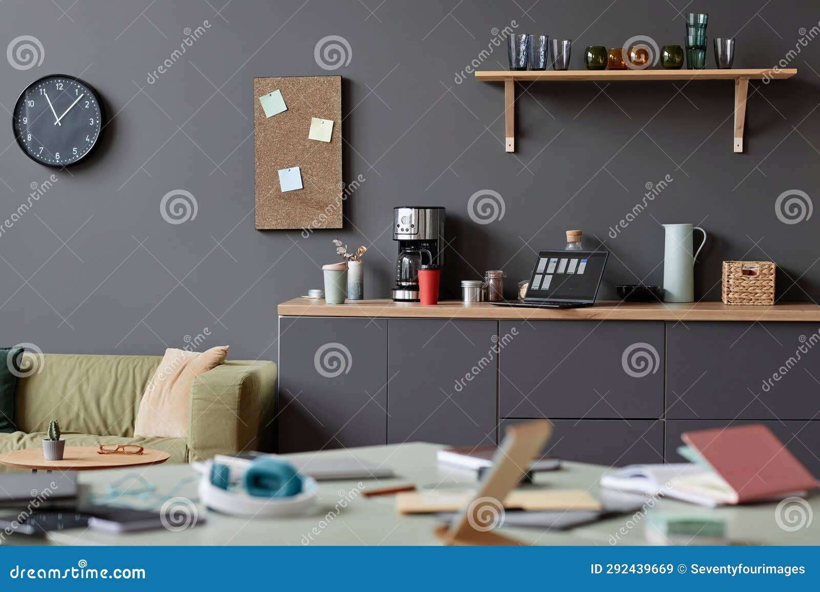 Cluttered Office Space in Neutral Grey with Focus on Coffee Station ...