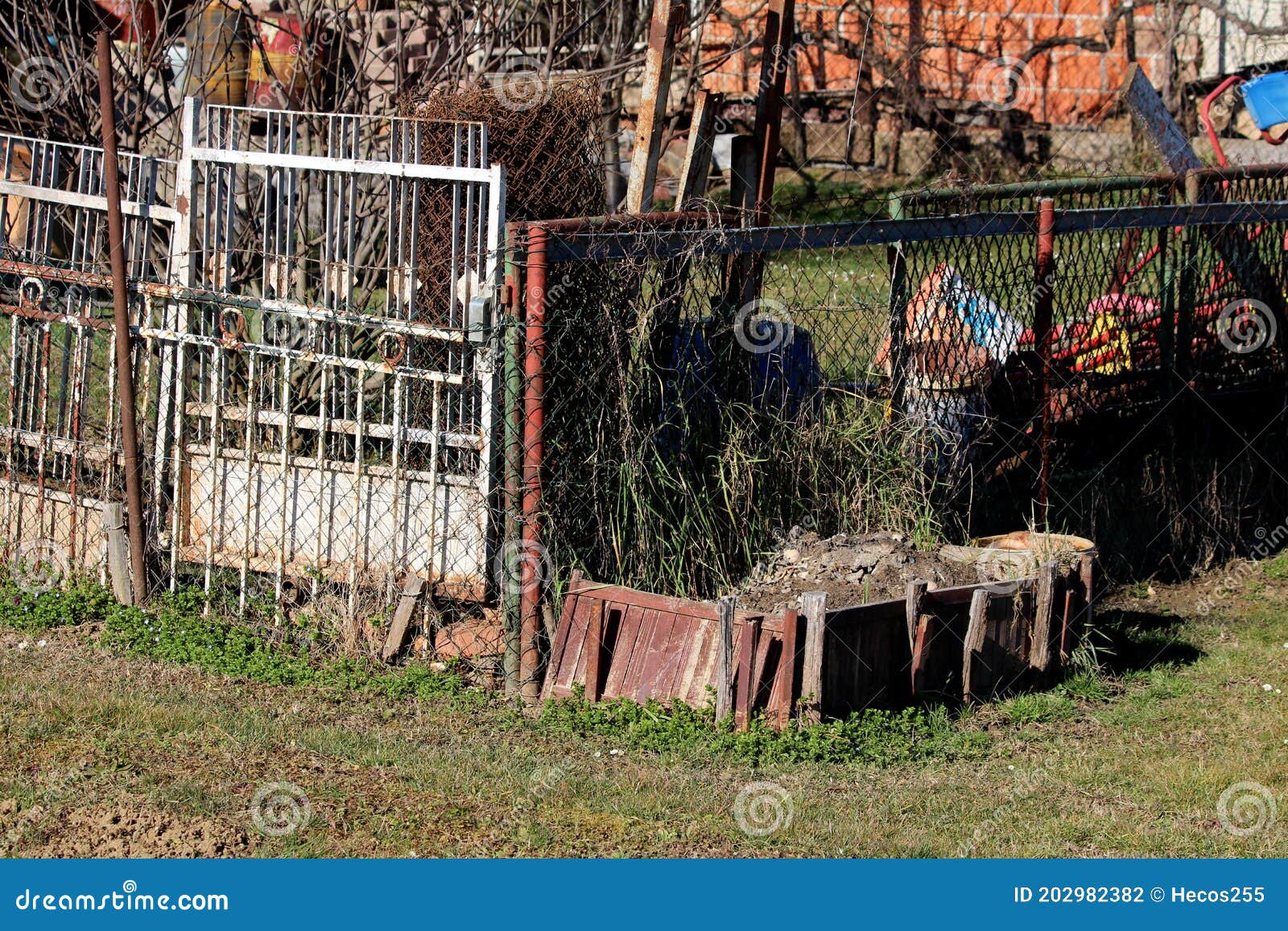 Cluttered Old Family House Backyard Filled with Construction Material ...