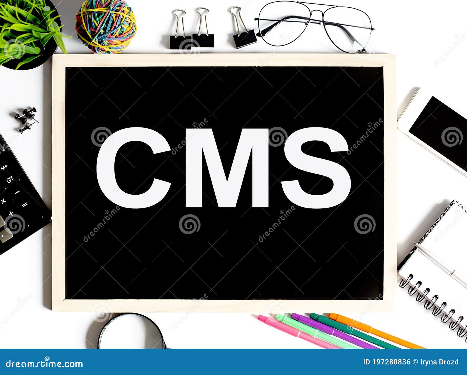 CMS Concept on the Drawing Board with Office Tools Stock Photo - Image ...