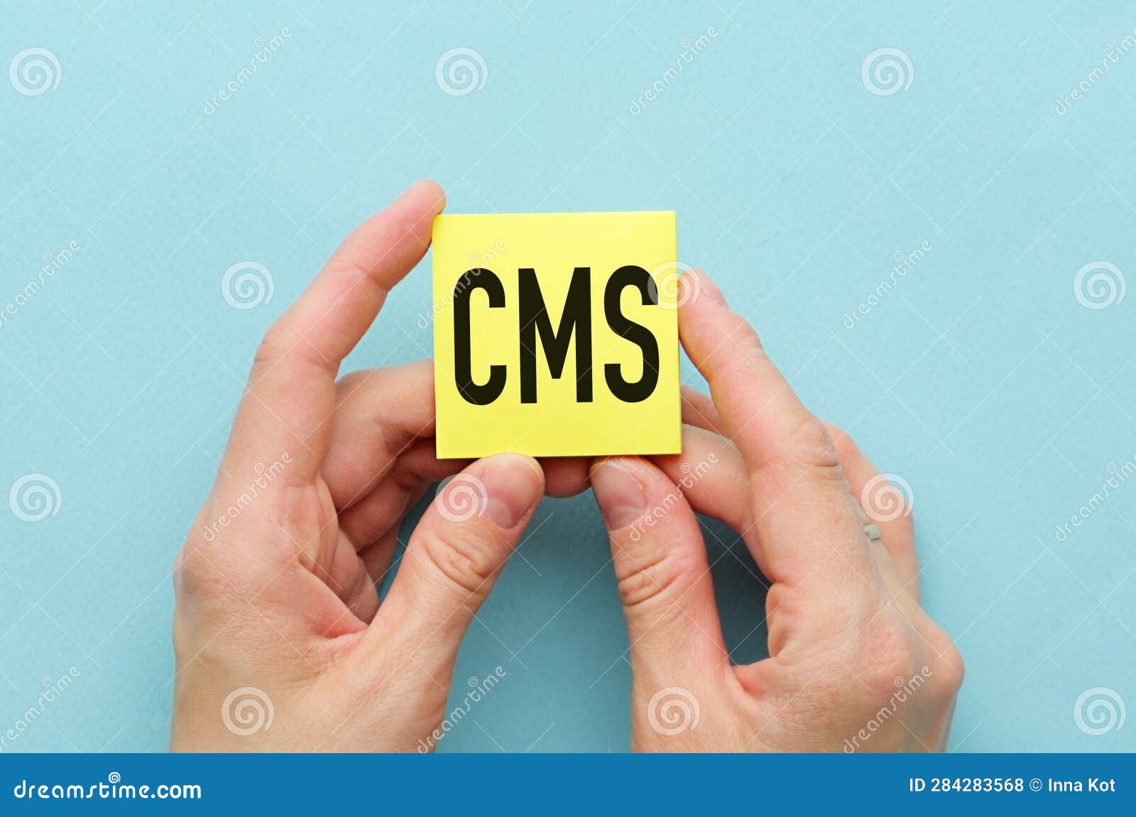 CMS Text Written on Yellow Sticker Notepad on the Blue Background ...
