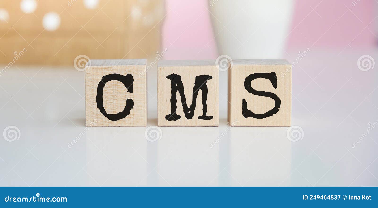 CMS is a Word Written on Wooden Blocks. the Text is Written in Black ...