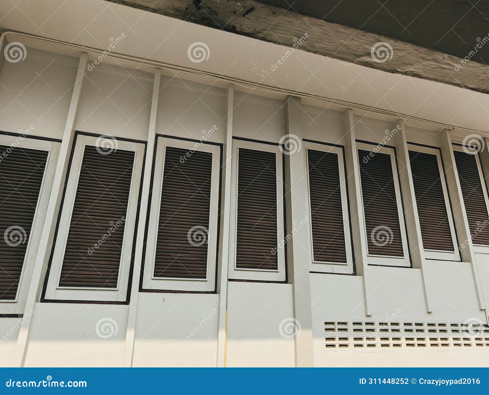 Windows of a White Building in Sloping Alignment. Stock Photo - Image ...