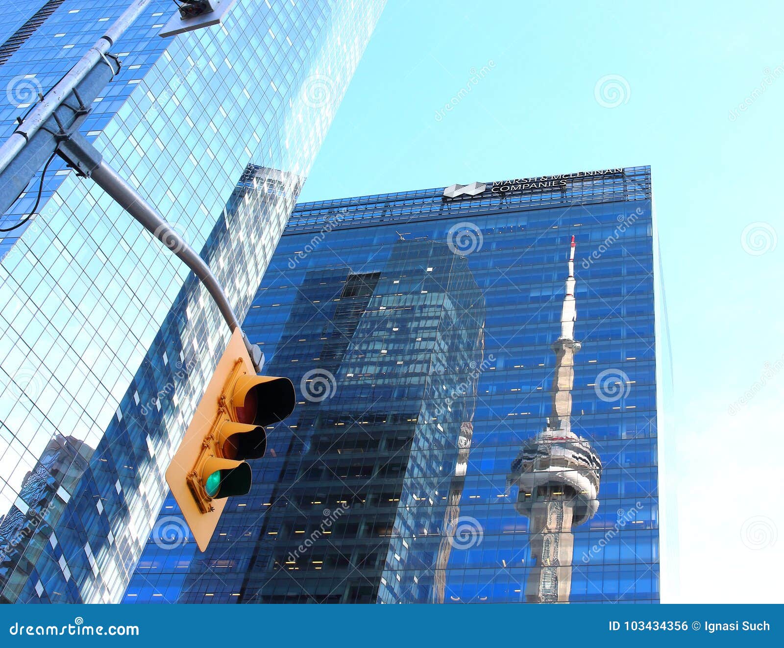 CN Tower Reflected in Marsh & McLennan Skyscraper in Toronto. Editorial ...