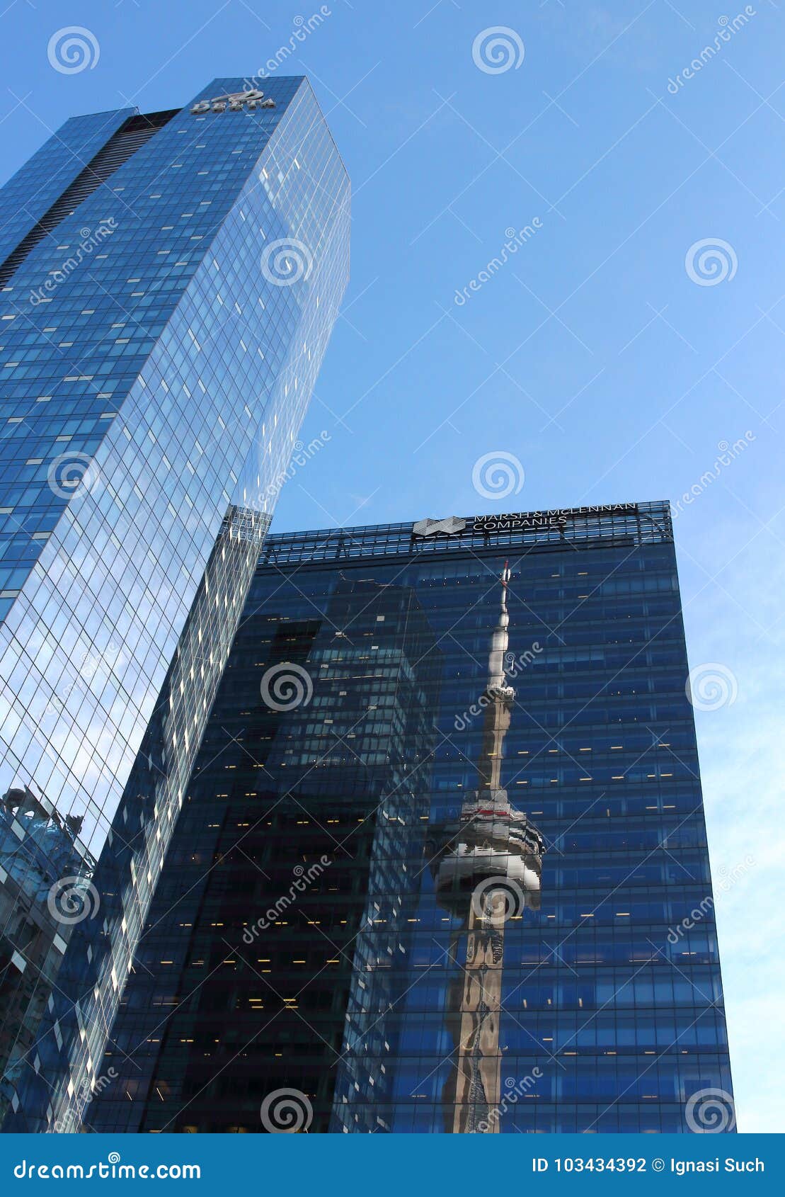 CN Tower Reflected in Marsh & McLennan Skyscraper in Toronto. Editorial ...