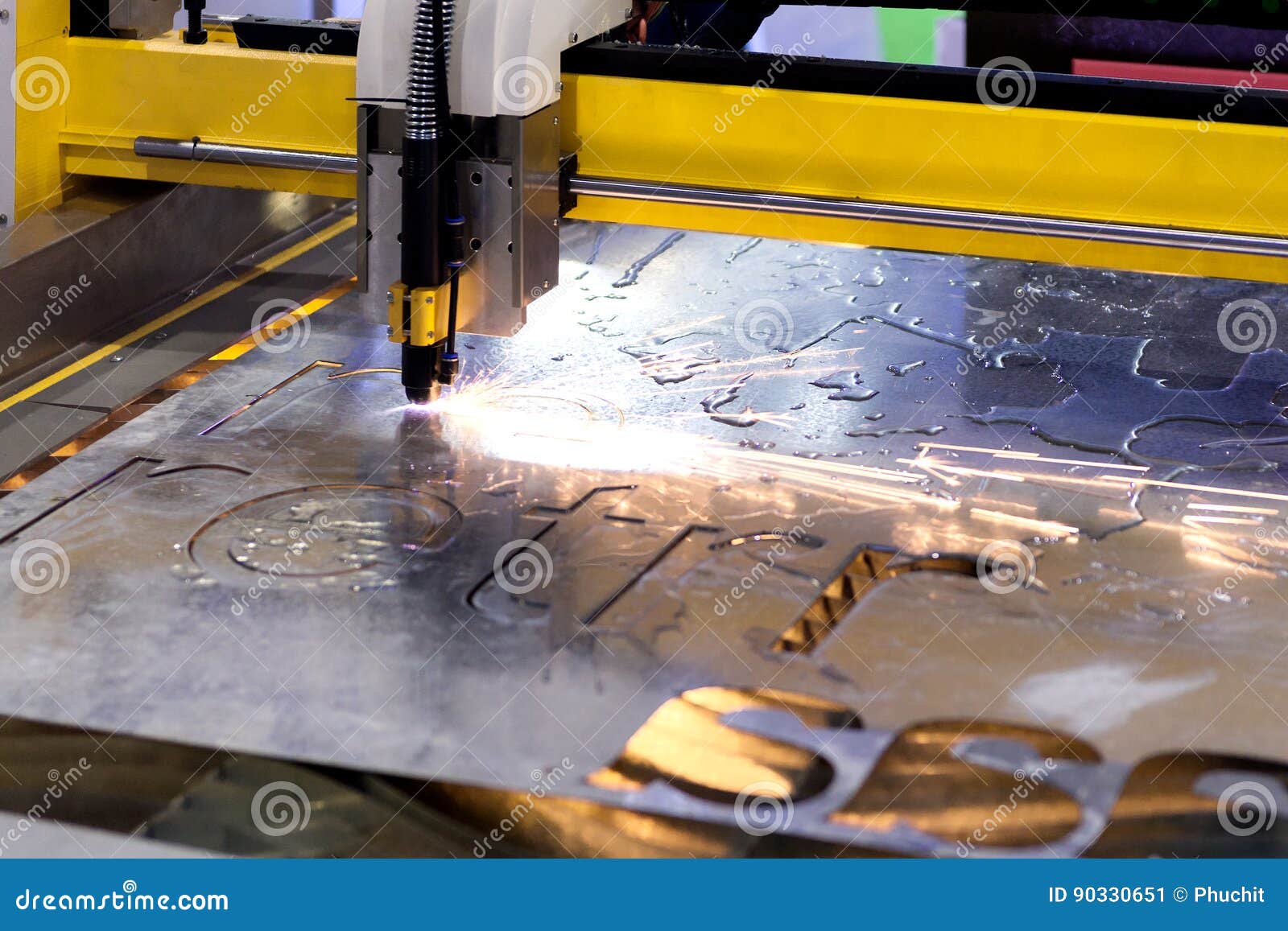 The CNC laser cut machine stock image. Image of iron - 90330651