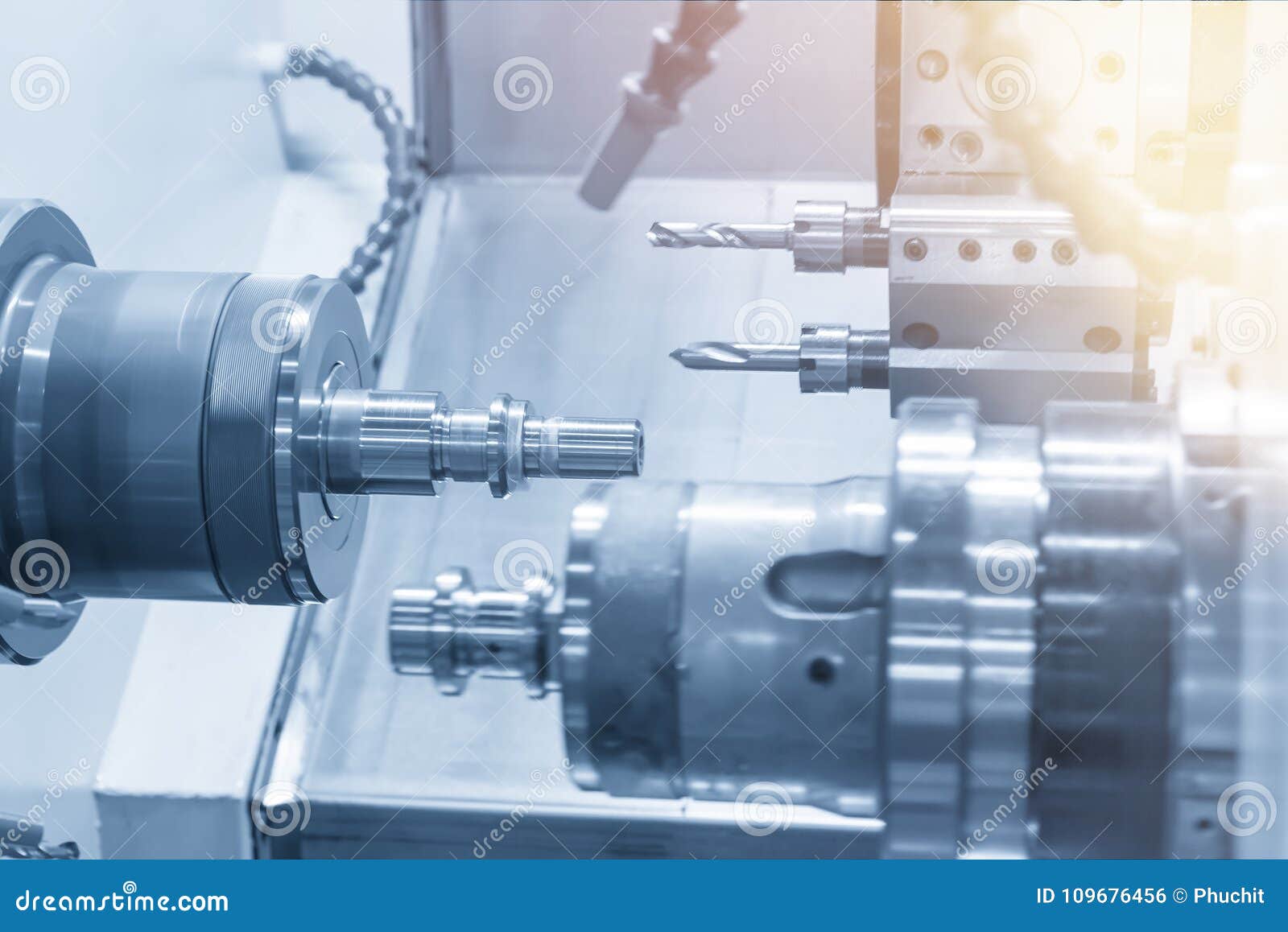 The CNC Lathe Machine Cutting the Metal Shaft Stock Photo - Image of ...