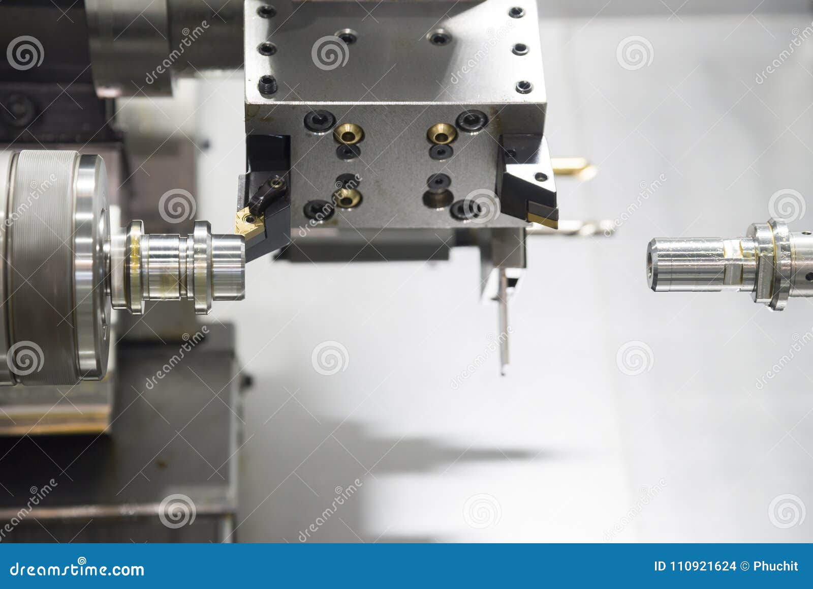 The CNC Lathe Machine Cutting the Metal Shaft Stock Photo - Image of ...