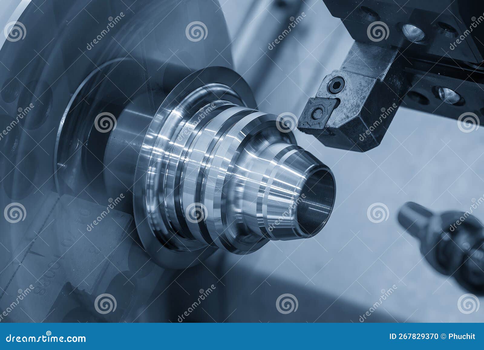 The CNC Lathe Machine Forming Cutting the Metal Cone Shape Parts Stock ...