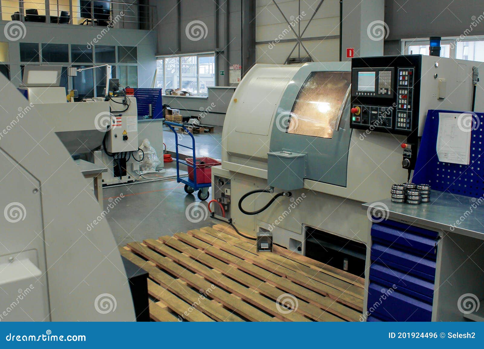 The CNC Lathe Machine. Turning Machine for Drilling with the Drill Tool ...