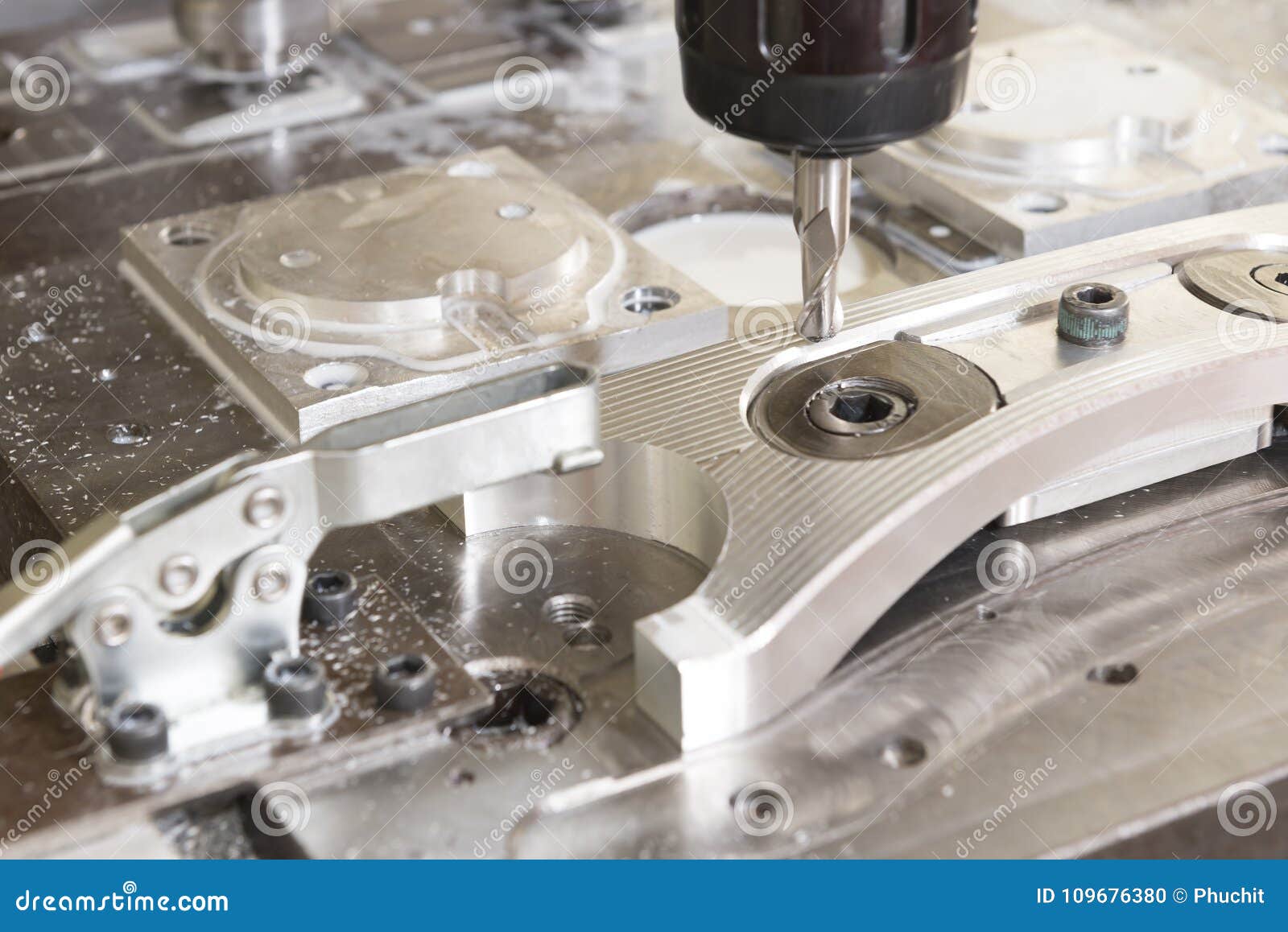 The CNC Milling Machine Cutting the Automotive Part Stock Photo - Image ...