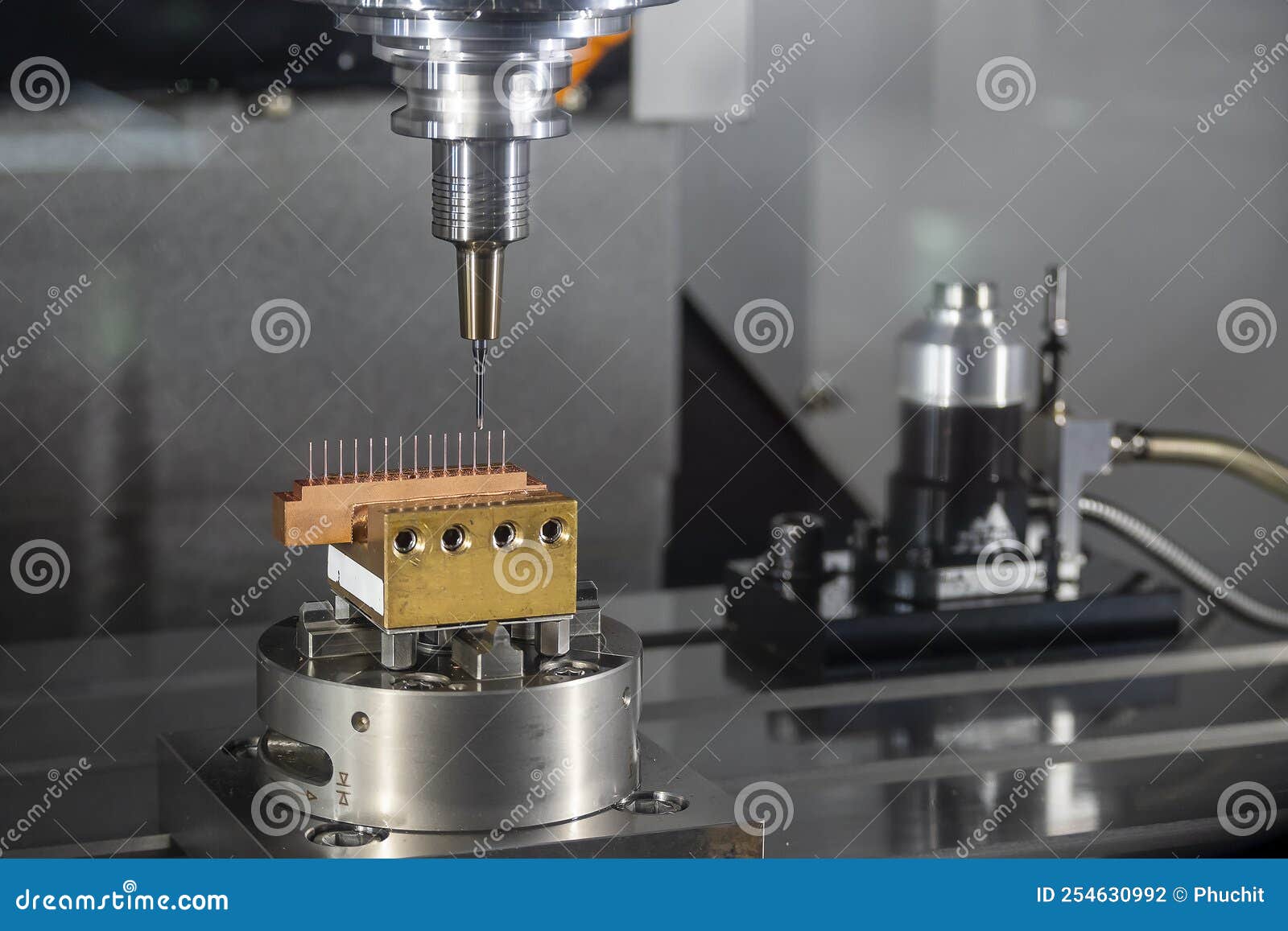 The CNC Milling Machine Cutting the Copper Electrode Parts with Solid ...