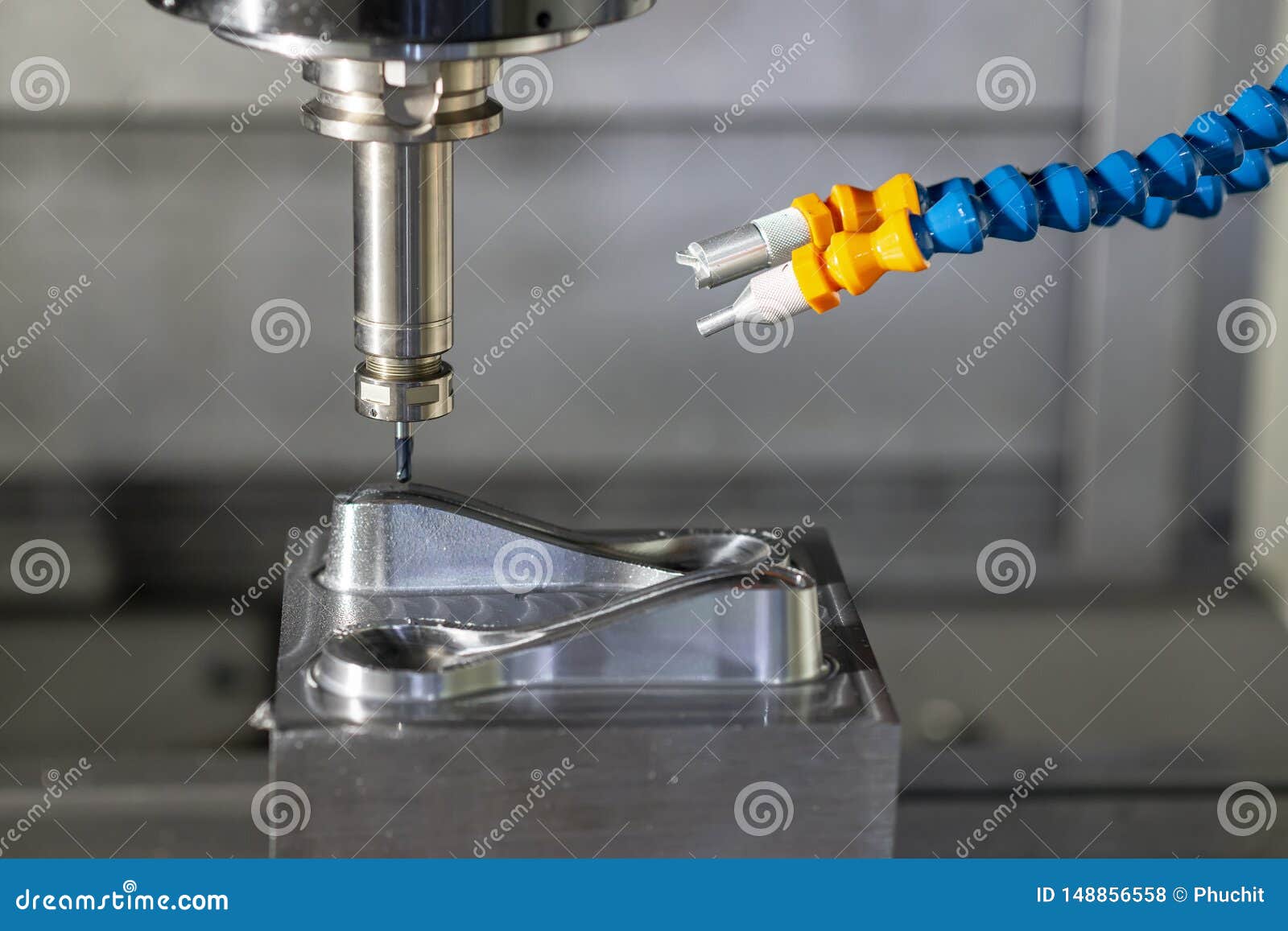 The CNC Milling Machine Cutting the Mould Part with the Solid Ball End ...