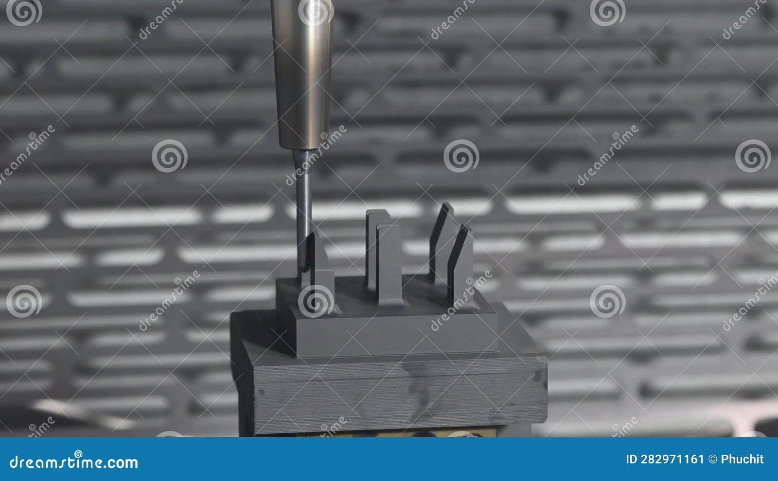 The CNC Milling Machine Finish Cutting the Graphite Electrode Parts ...