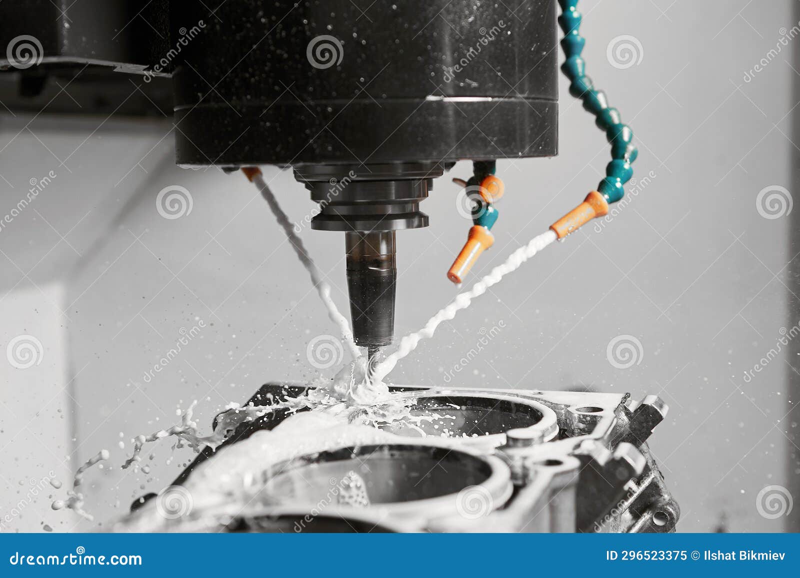 CNC Milling Machine Grinds Holes in Car Engine with Coolant. Process of ...