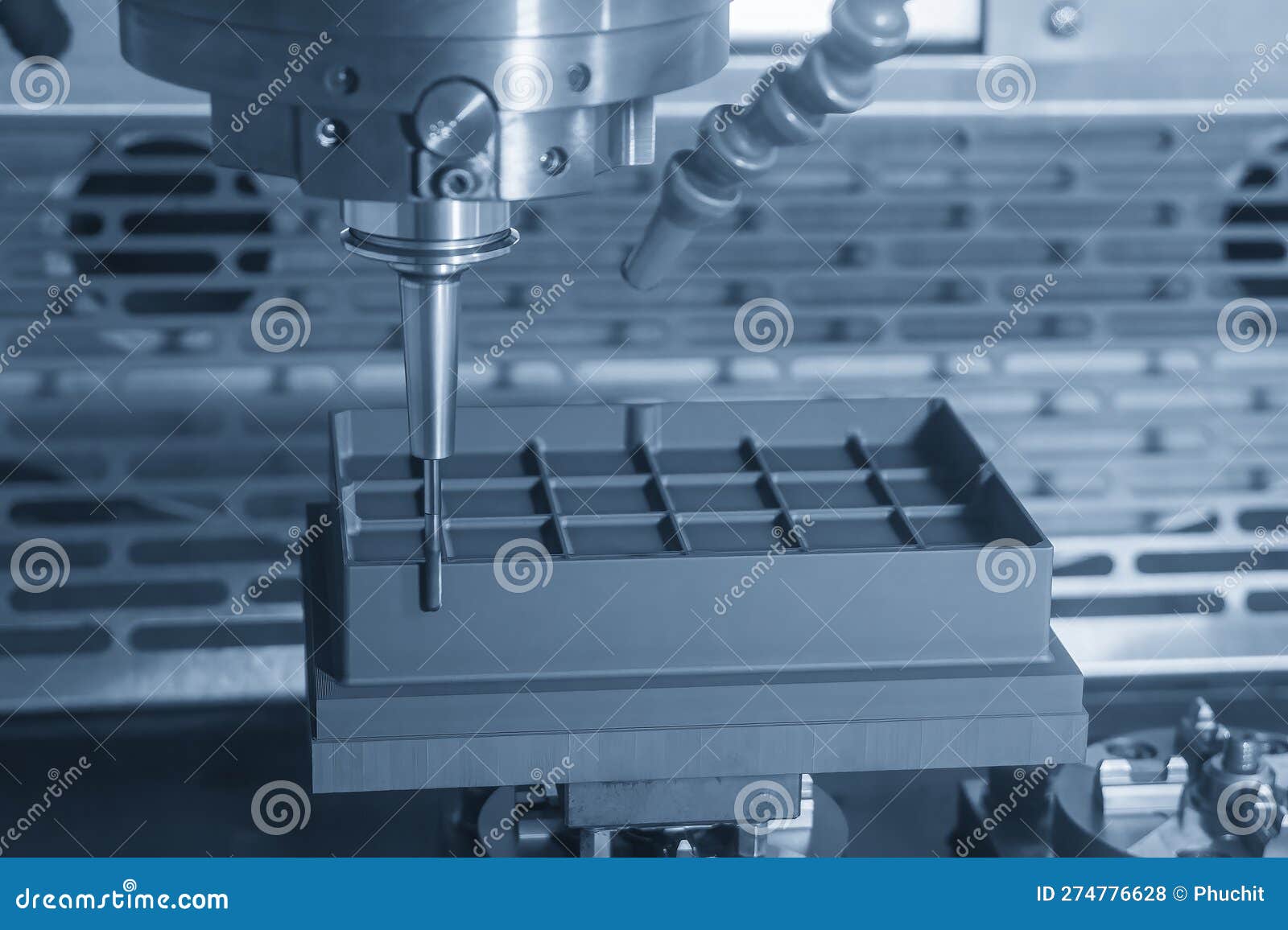 The CNC Milling Machine Rough Cutting the Graphite Electrode Parts with ...