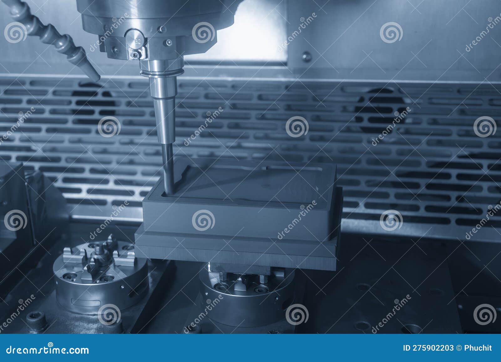 The CNC Milling Machine Rough Cutting the Graphite Electrode Parts with ...