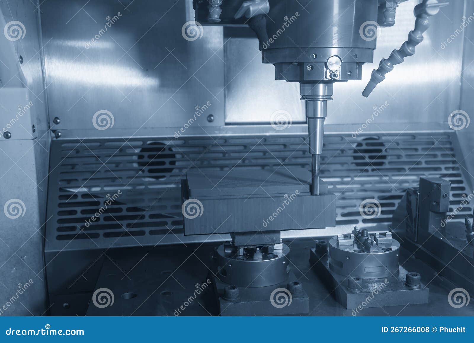 The CNC Milling Machine Rough Cutting the Graphite Electrode Parts with ...