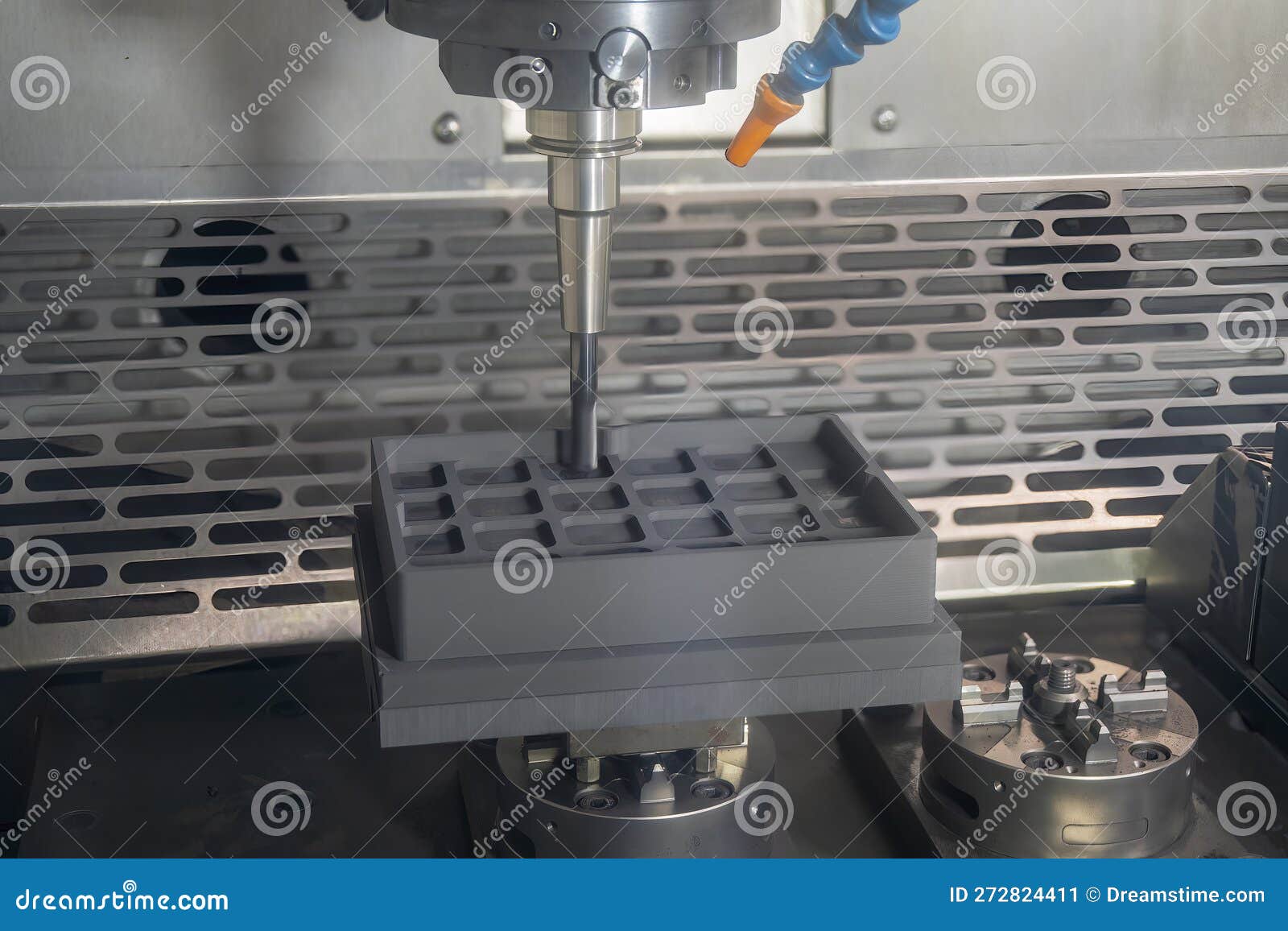 The CNC Milling Machine Rough Cutting the Graphite Electrode Parts with ...