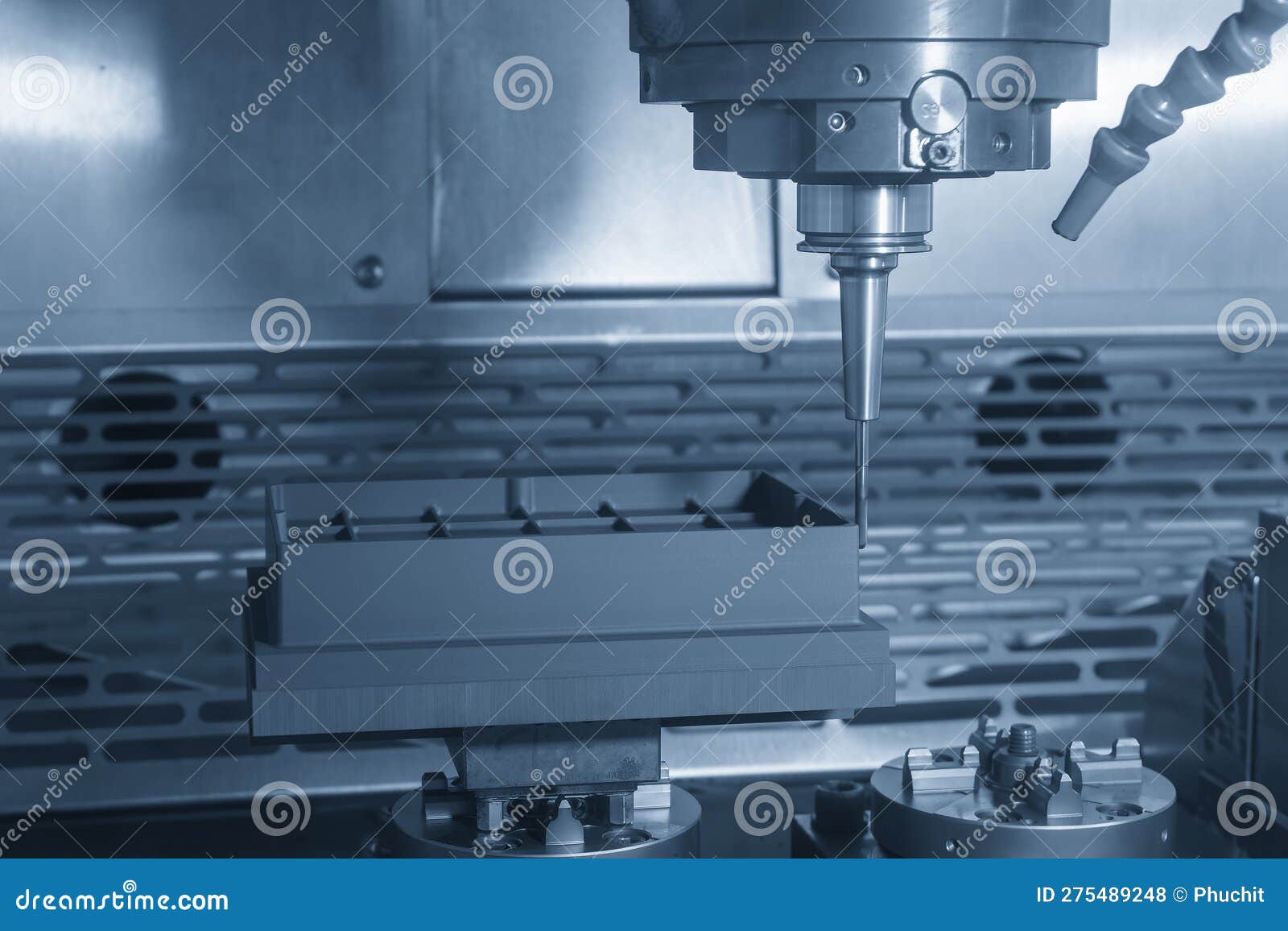 The CNC Milling Machine Rough Cutting the Graphite Electrode Parts with ...