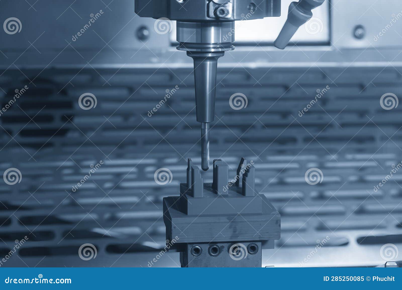 The CNC Milling Machine Rough Cutting the Graphite Electrode Parts with ...