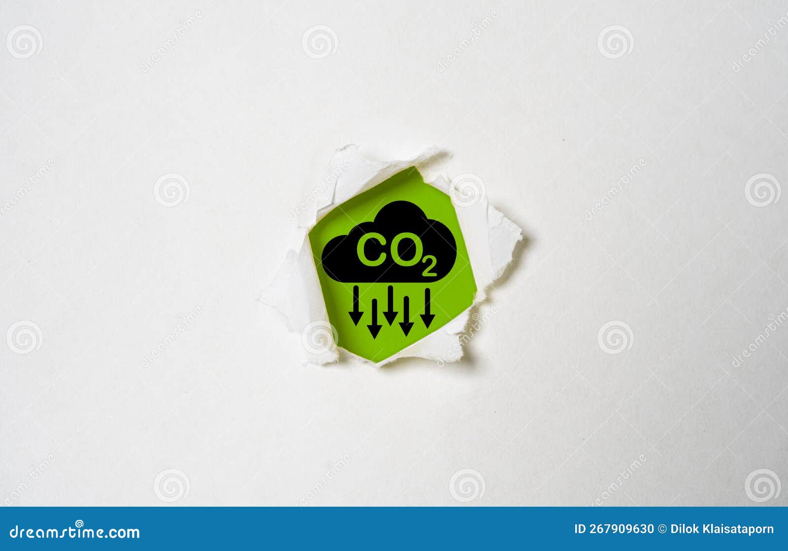 CO2 Reducing Icon On Green Background And White Punch For Decrease CO2 Or Carbon Dioxide ...