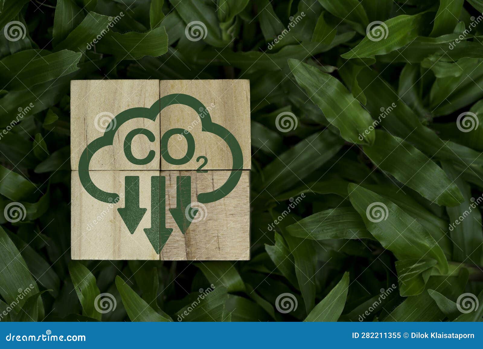 CO2 Reducing Icon Print Screen on Wooden Cube and Green Grass for Decrease CO2 , Carbon ...