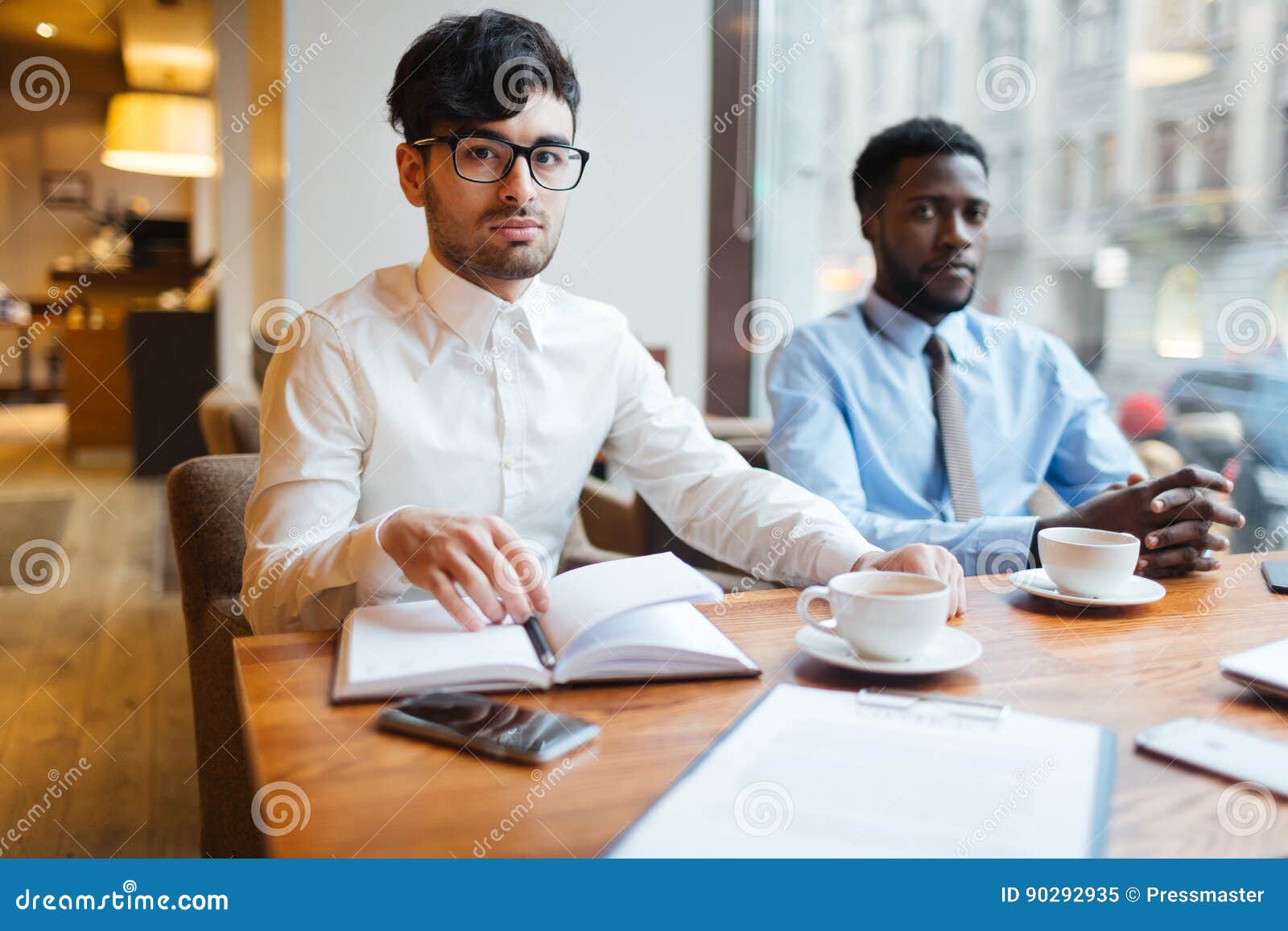 Co-workers in cafe stock image. Image of coworking, brainstorm - 90292935