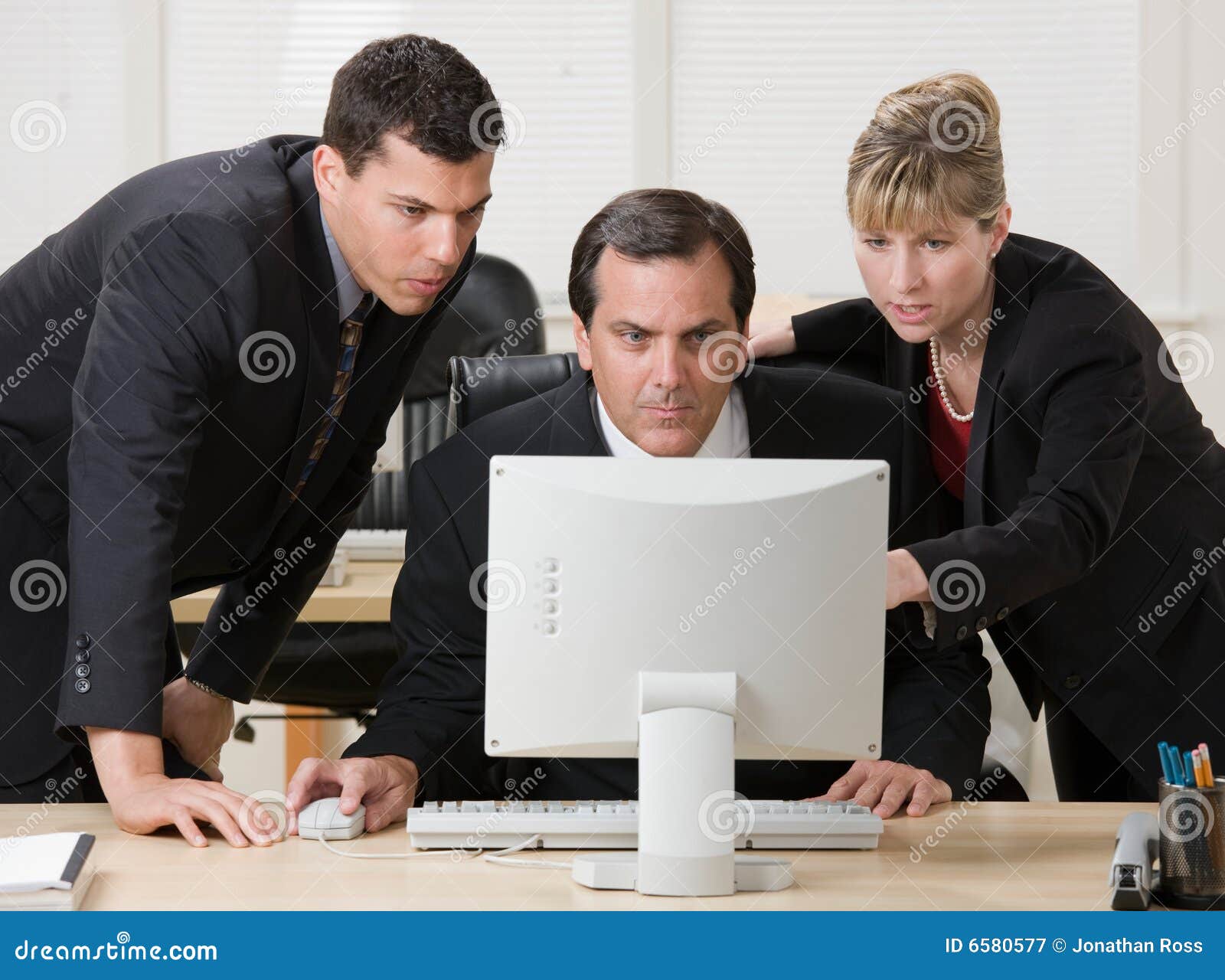 Co-workers Collaborating about Business Stock Image - Image of ...