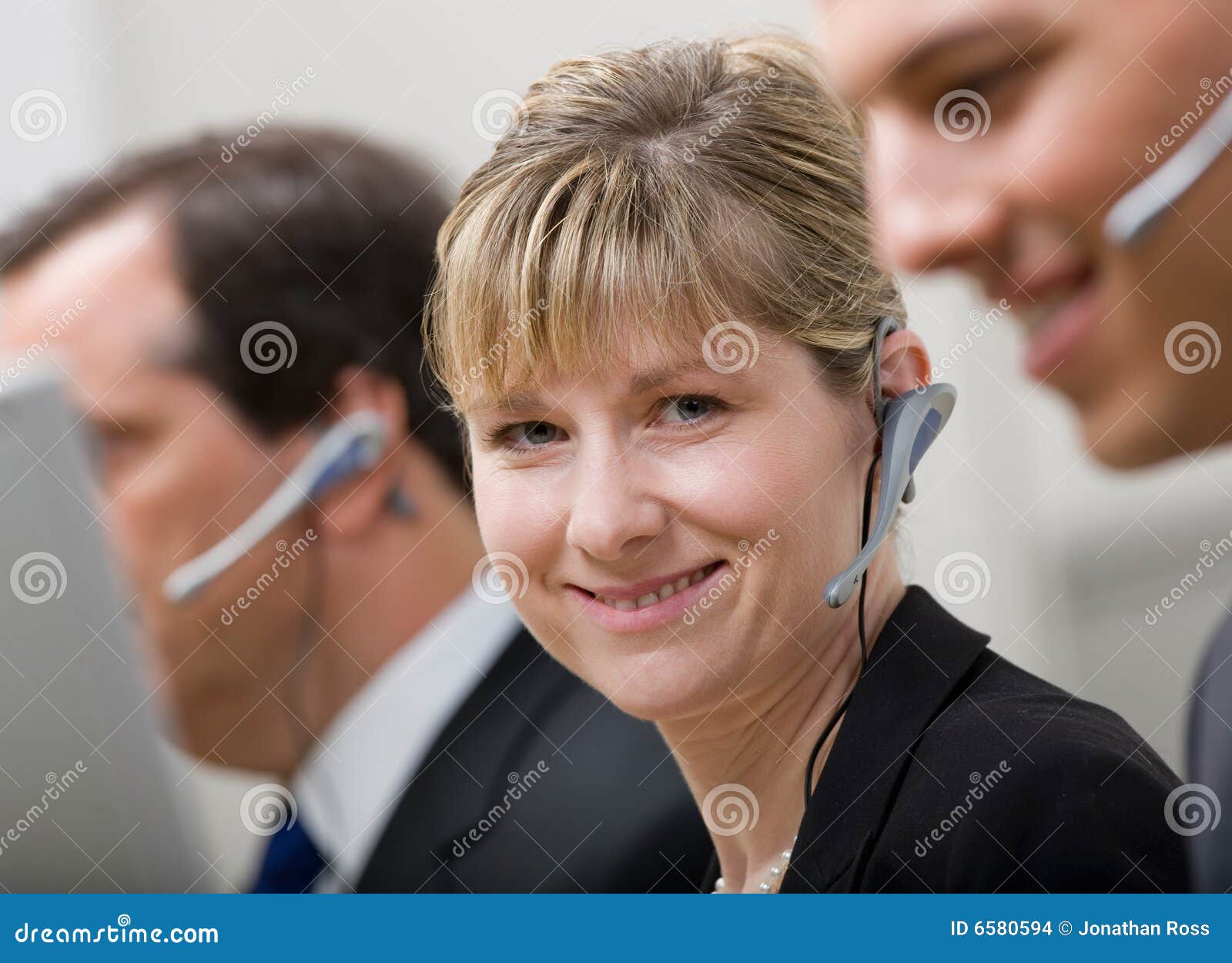 Co-workers in Headsets Working in Call Center Stock Photo - Image of ...