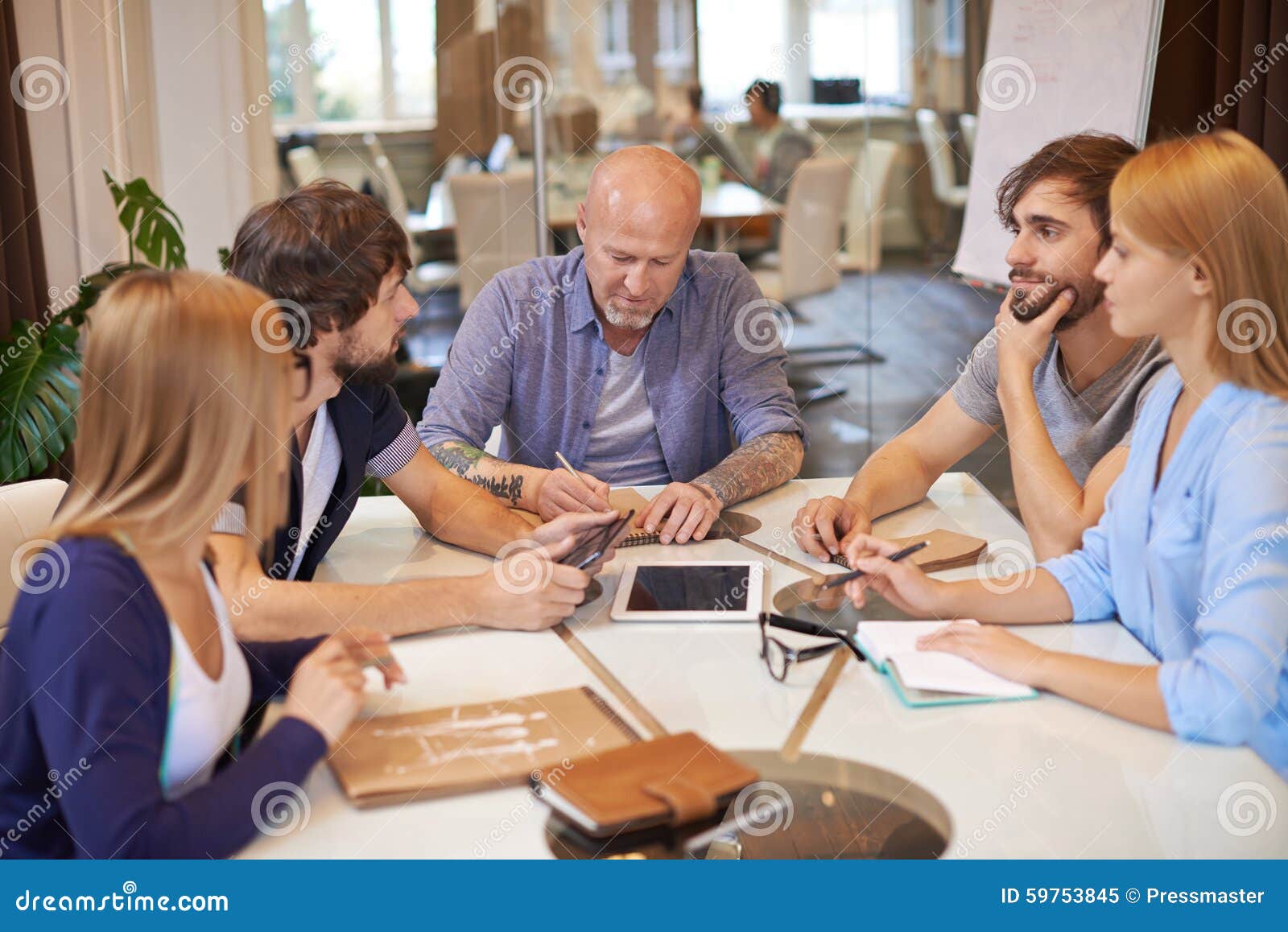 Co-workers at meeting stock image. Image of calm, businesspeople - 59753845