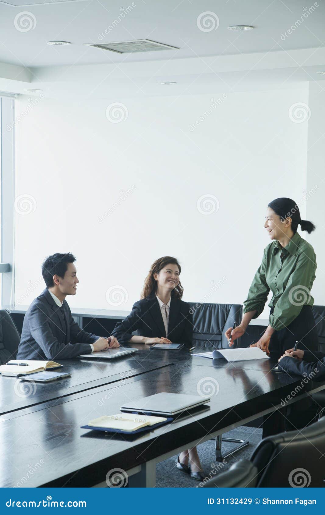 Co-workers in Meeting Room, Discussing Stock Image - Image of ...