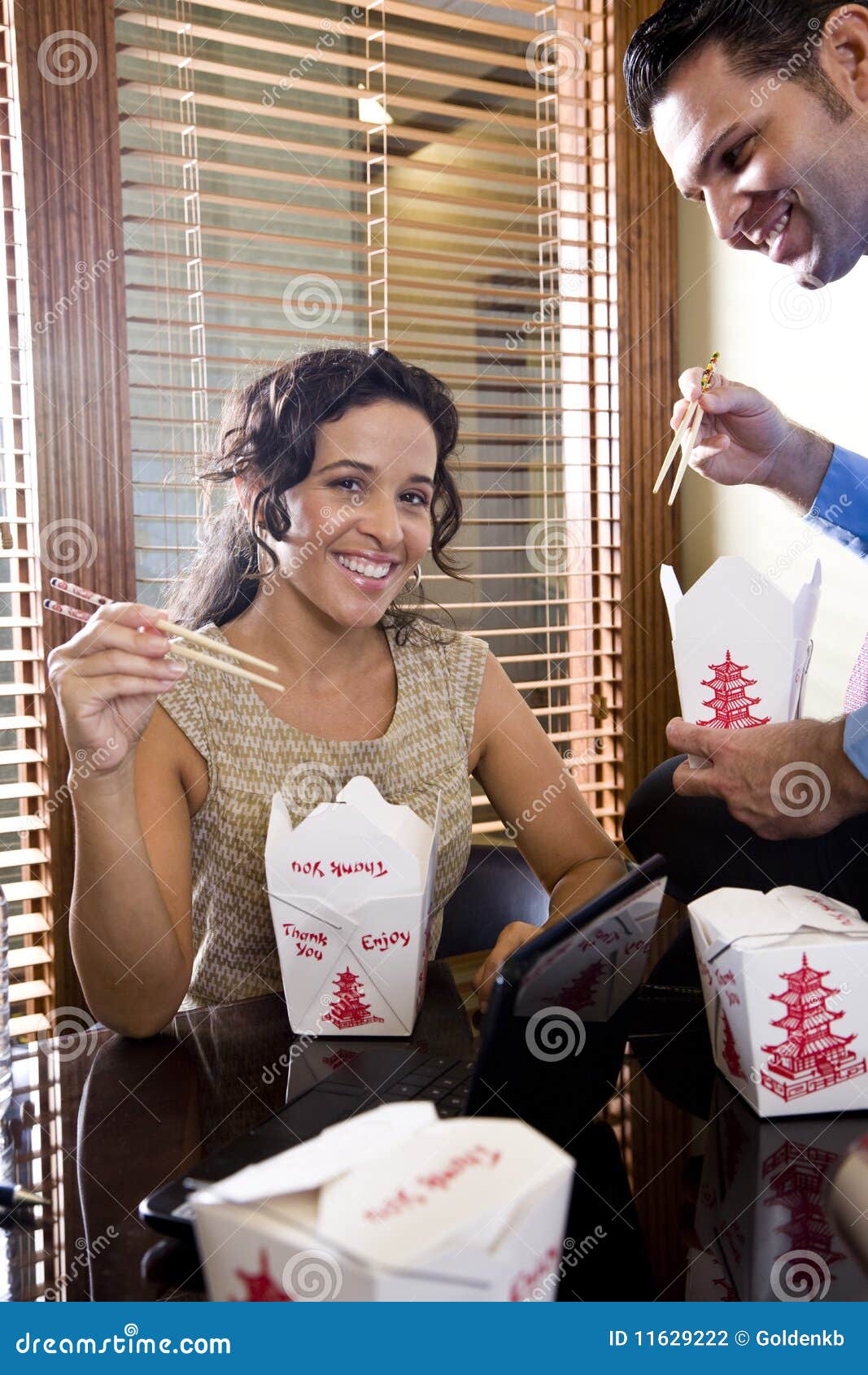 Co-workers in Office Eating Chinese Takeout Food Stock Photo - Image of ...