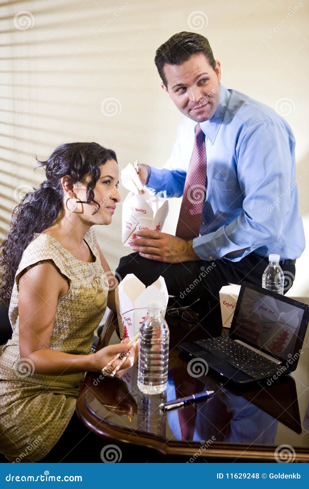 Co-workers in Office Eating Chinese Takeout Food Stock Photo - Image of ...