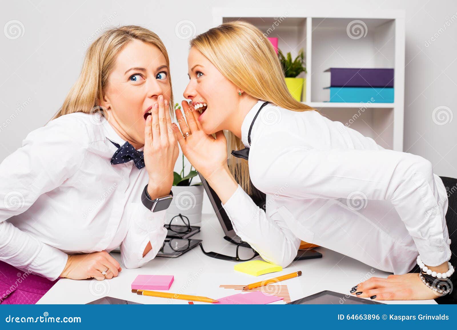Co-workers Sharing a Secret Stock Photo - Image of drama, surprise ...