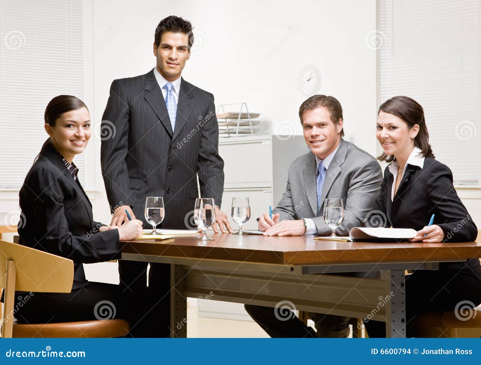 Co-workers and Supervisor in Conference Room Stock Photo - Image of ...