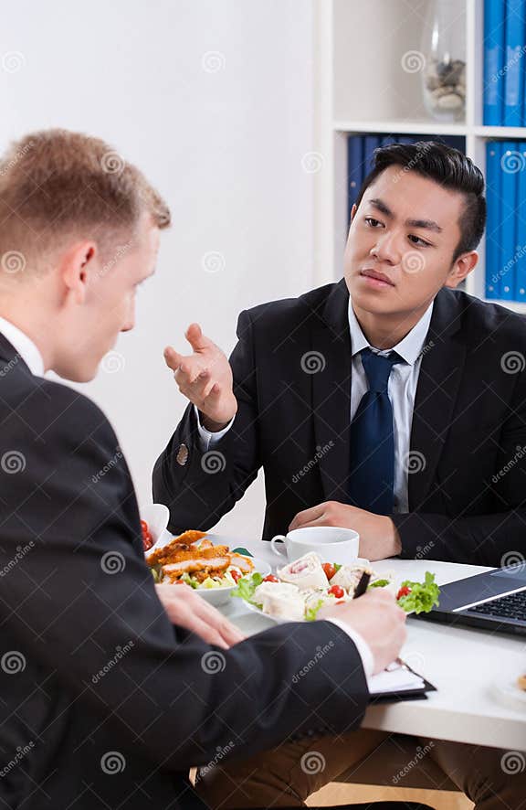 Co-workers Talking during Lunch Stock Image - Image of suit, coffee ...