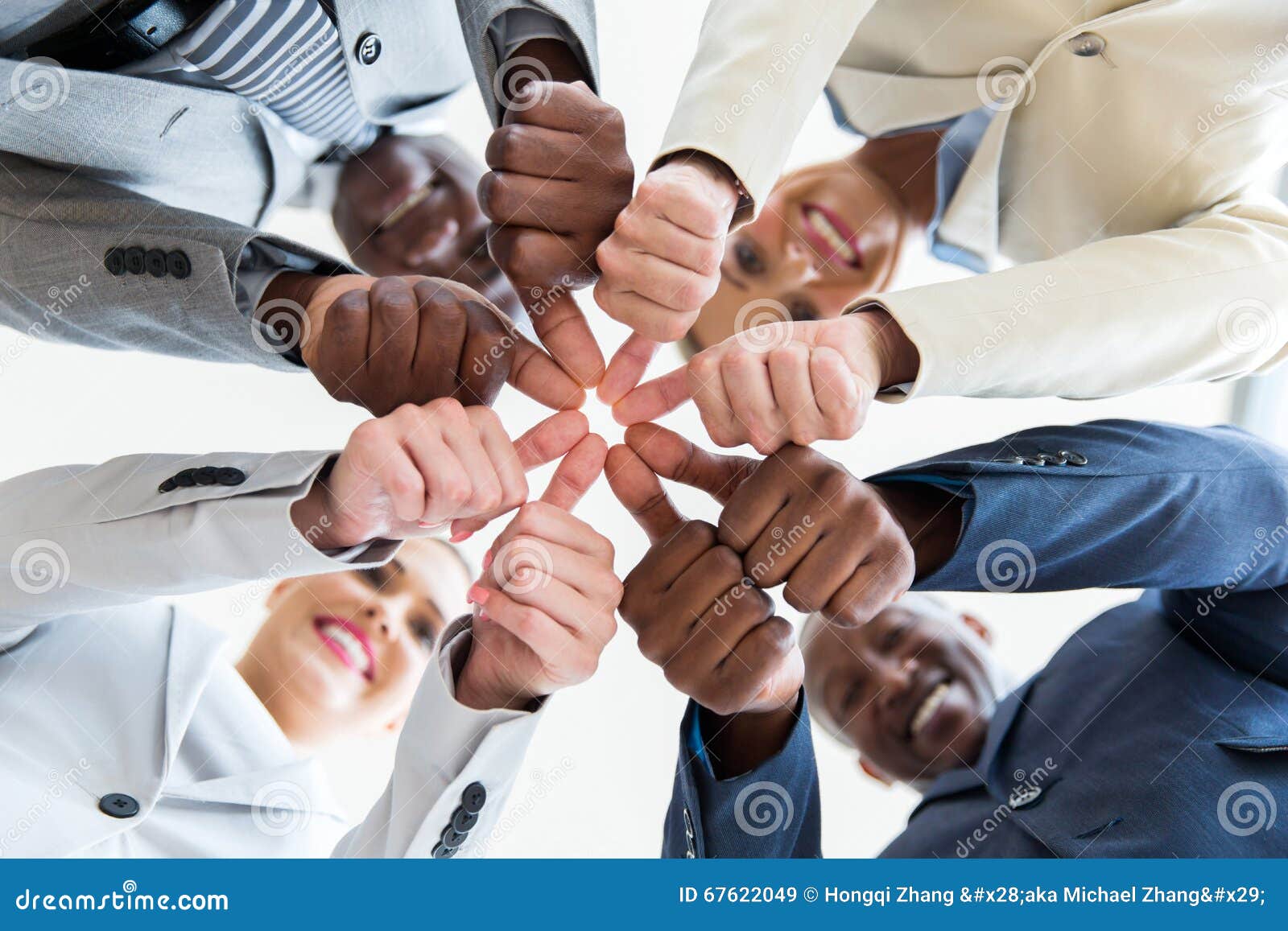 Co-workers Thumbs Joined Together Stock Image - Image of businesswoman ...