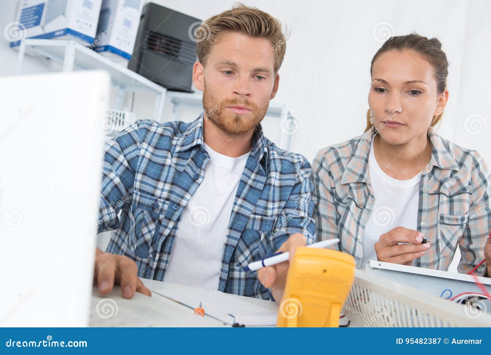 Co-workers Using Calibrating Device Stock Image - Image of analyser ...