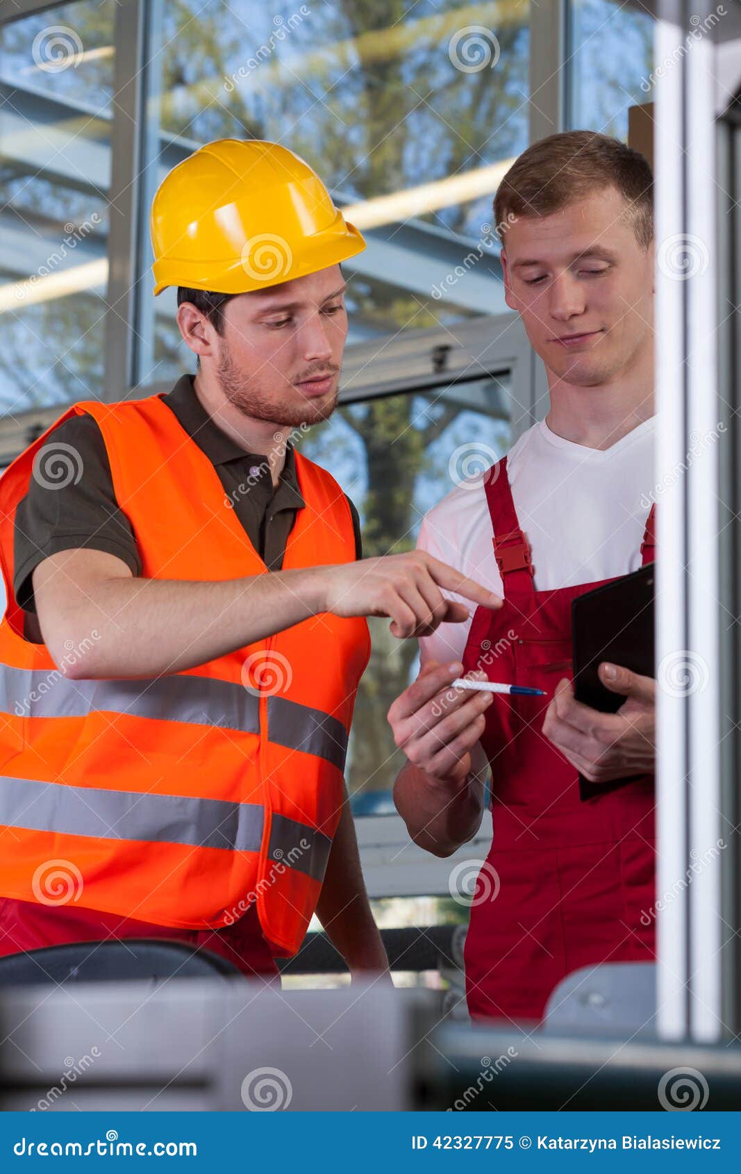 Workers Work With Cement Mortar, Loading The Hopper Bucket With Mortar ...
