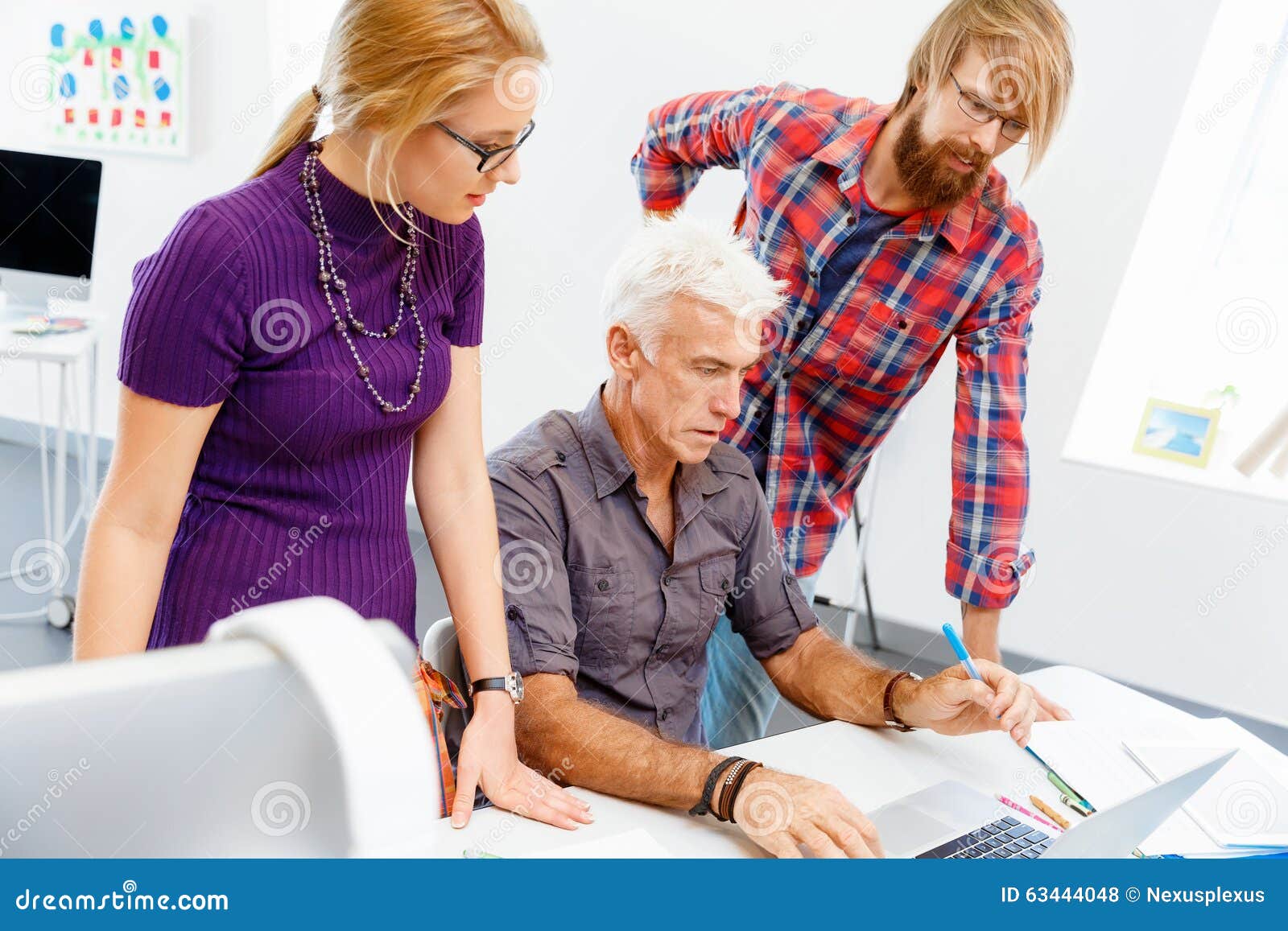 Co-workers Working Together Stock Photo - Image of businessman, indoors ...