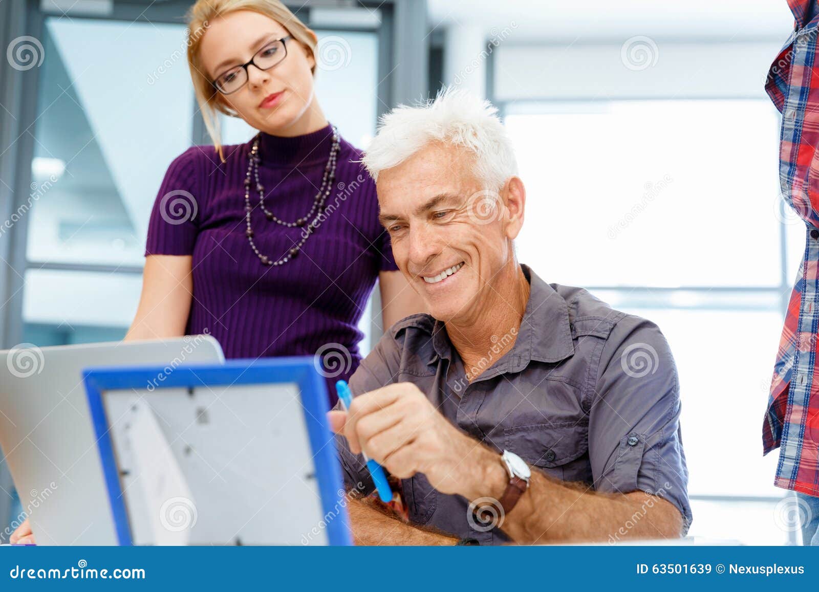 Co-workers Working Together Stock Image - Image of person, design: 63501639