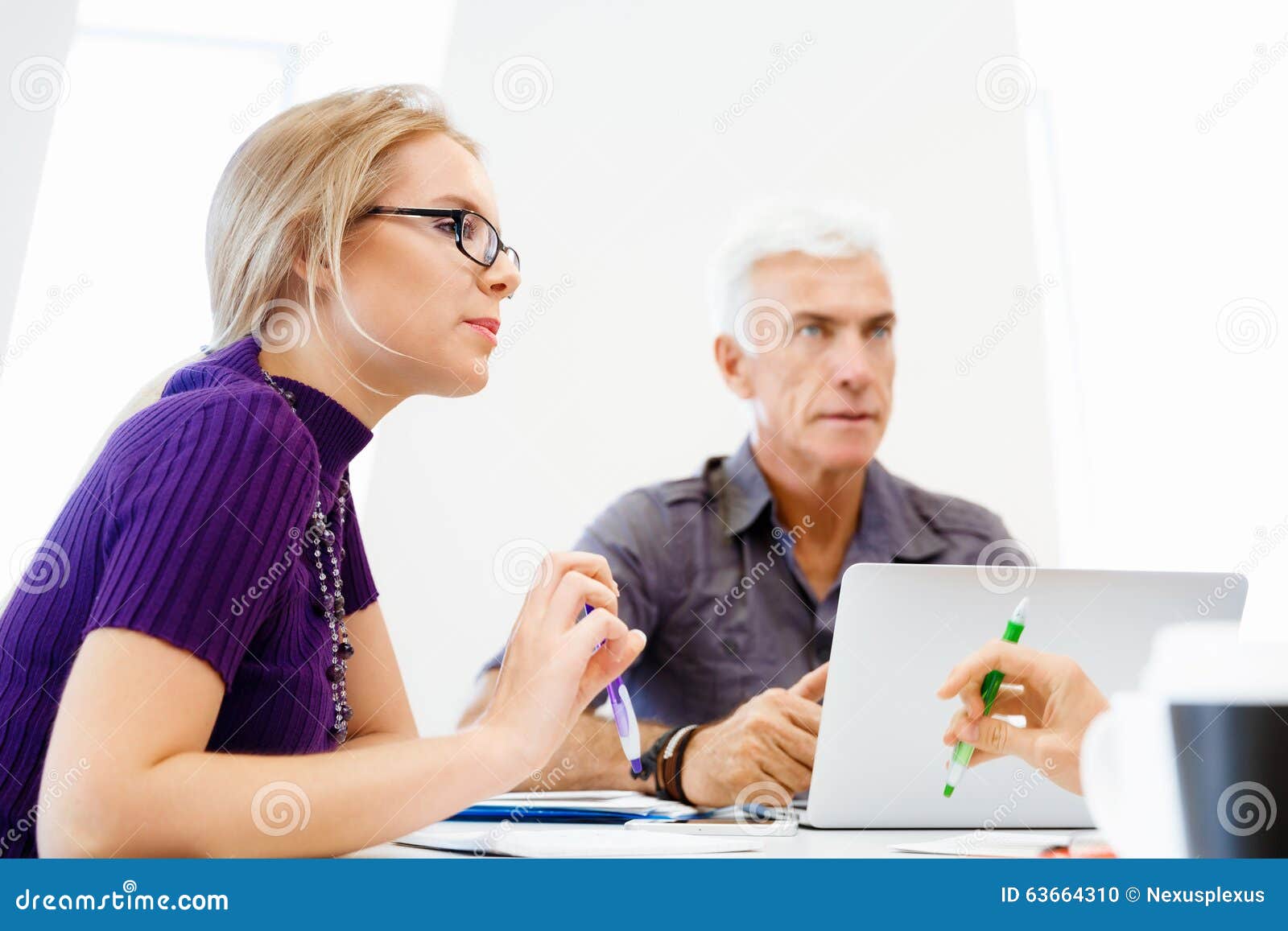 Co-workers Working Together Stock Photo - Image of indoors, tablet ...
