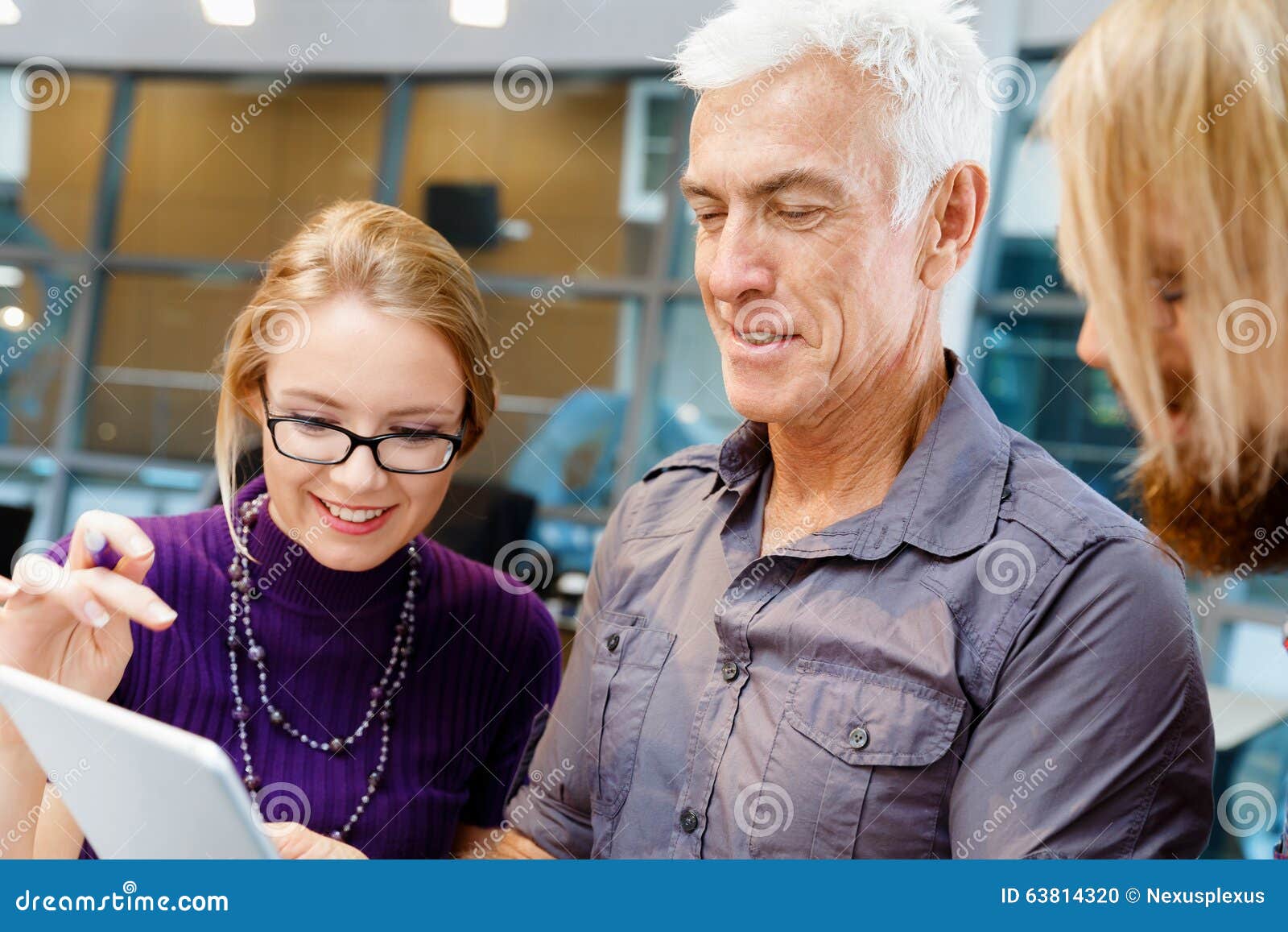 Co-workers Working Together Stock Photo - Image of occupation, tablet ...