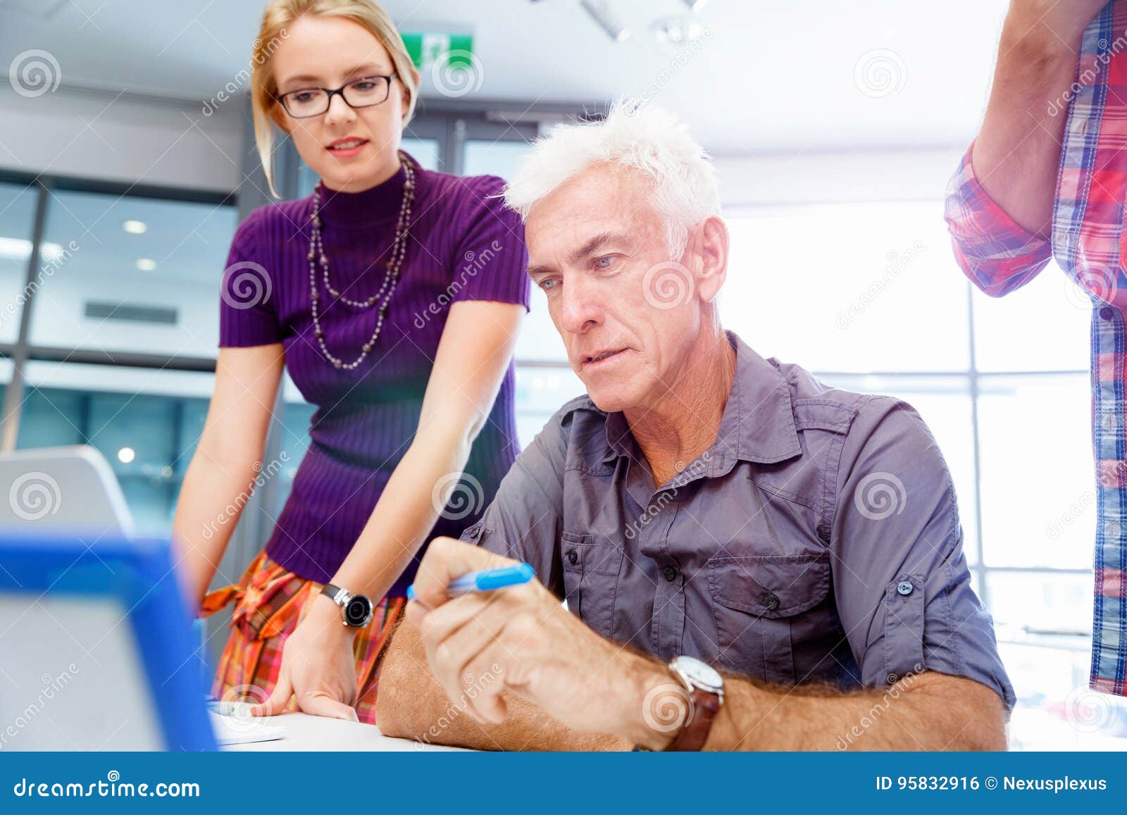 Co-workers Working Together Stock Photo - Image of desk, people: 95832916