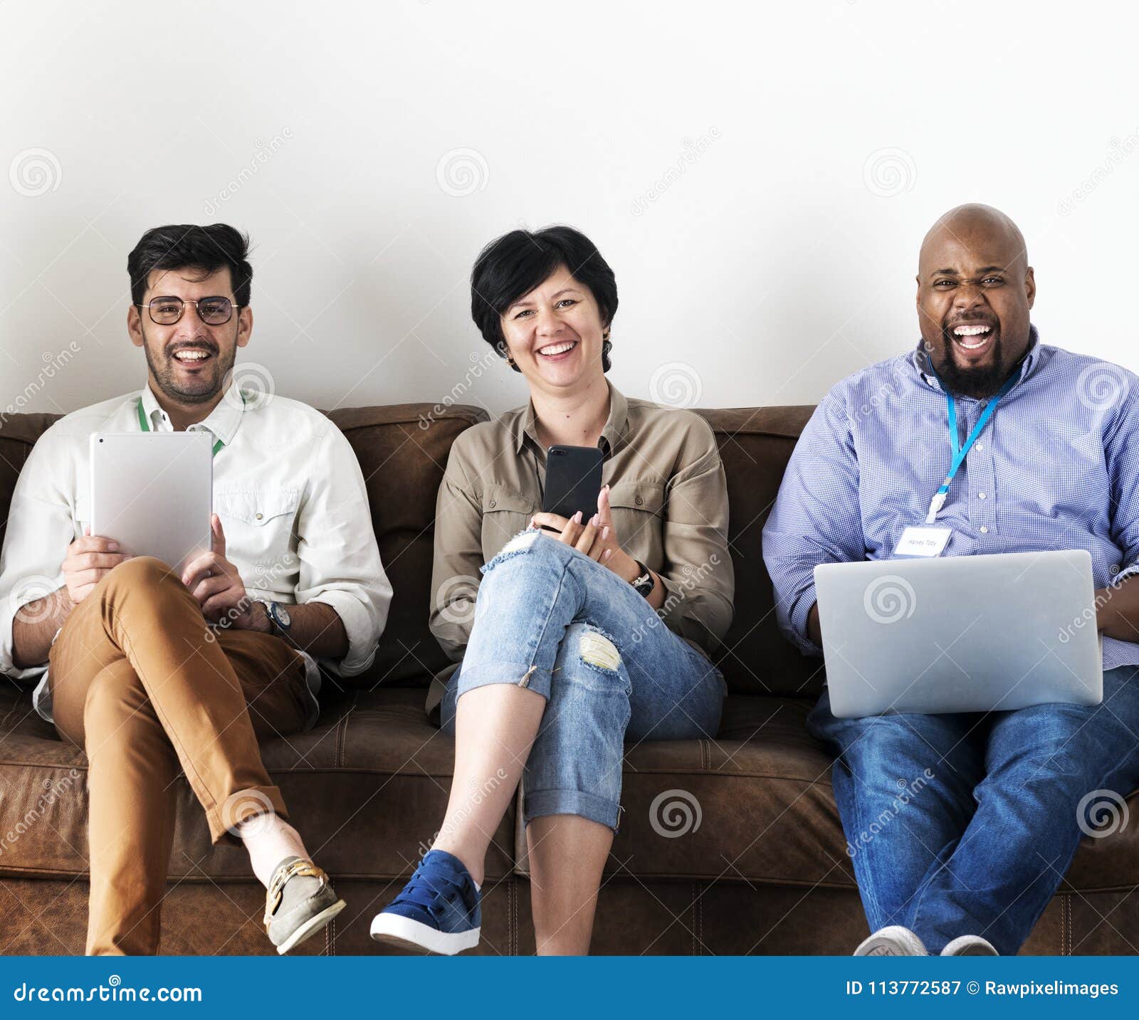 Co-workers Working Together in the Office Stock Image - Image of couch ...